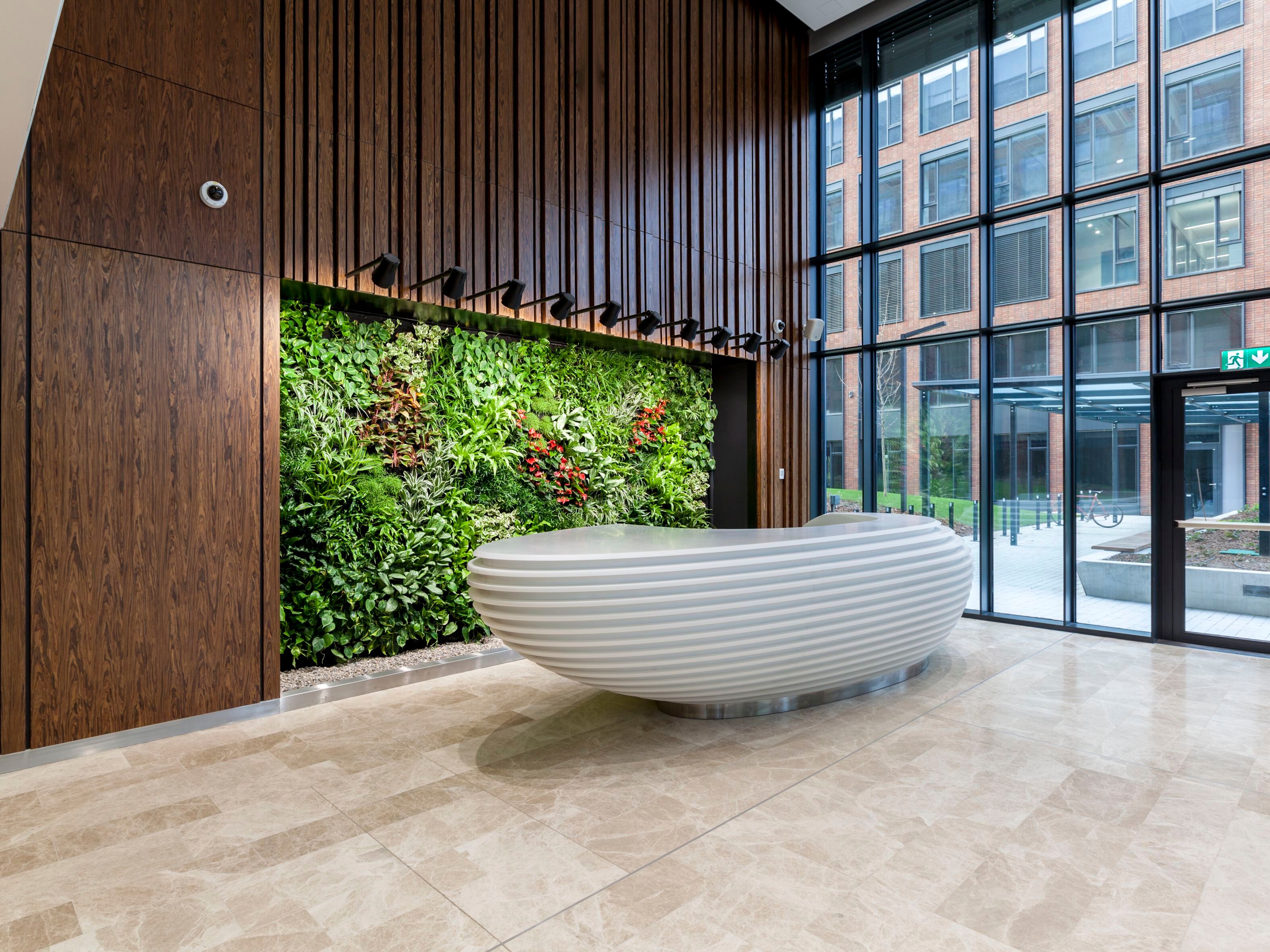 TWIN CITY Wood veneer reception desk By AMOSDESIGN