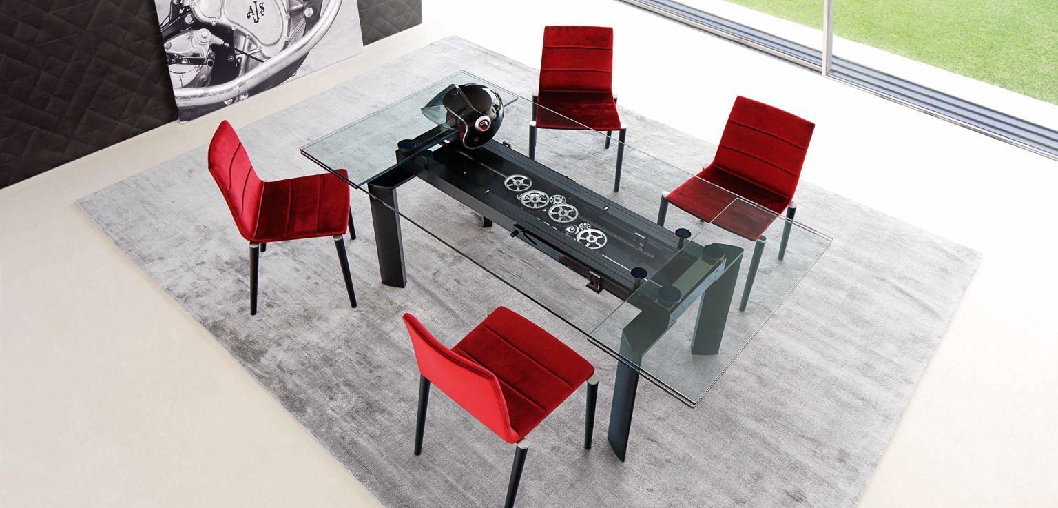 ASTROLAB Extending glass and aluminium dining table By Roche Bobois