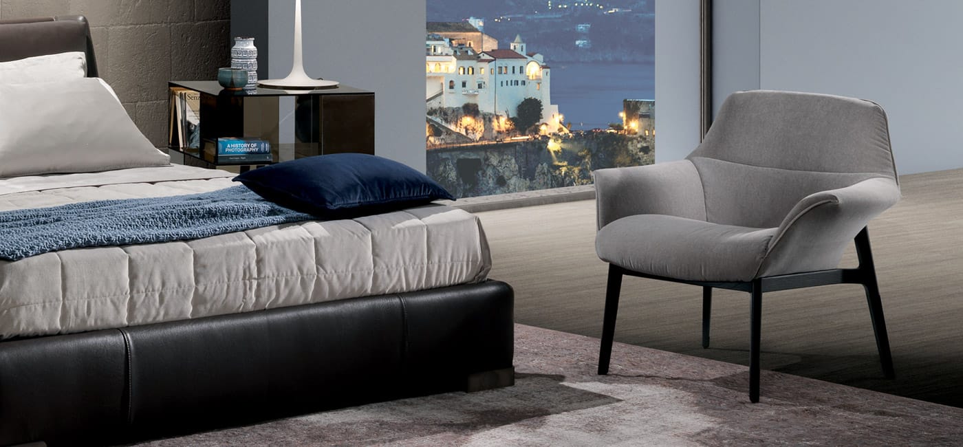 AURA | Fabric easy chair By Natuzzi Italia design Claudio Bellini