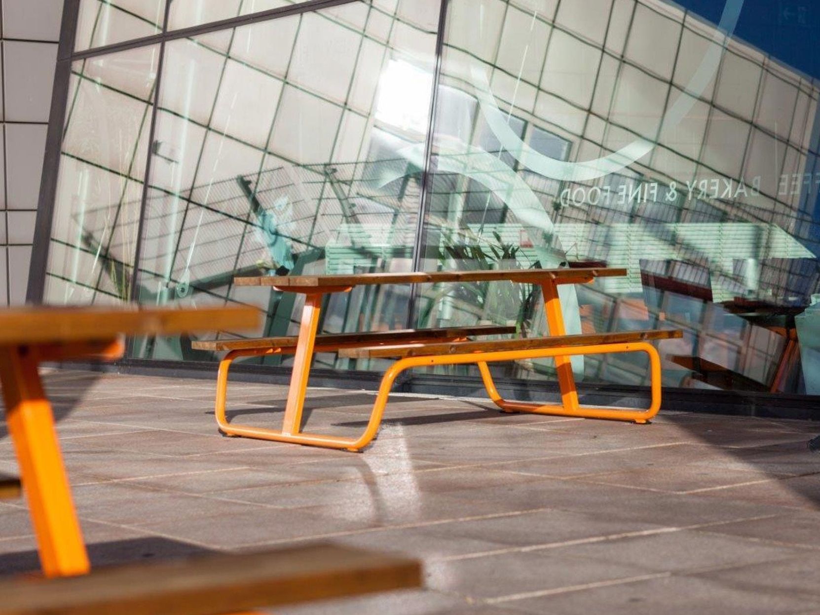 BERG Steel and wood picnic table with integrated benches By VESTRE