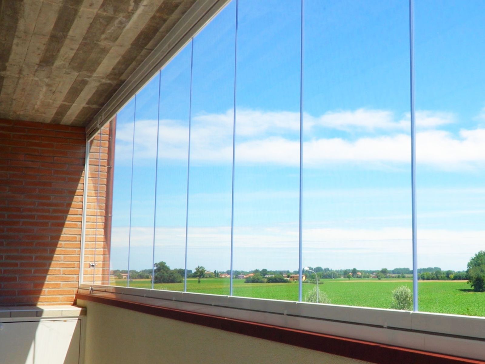 Vetrate scorrevoli panoramiche tutto vetro Vetrate per balconi - Belle ...