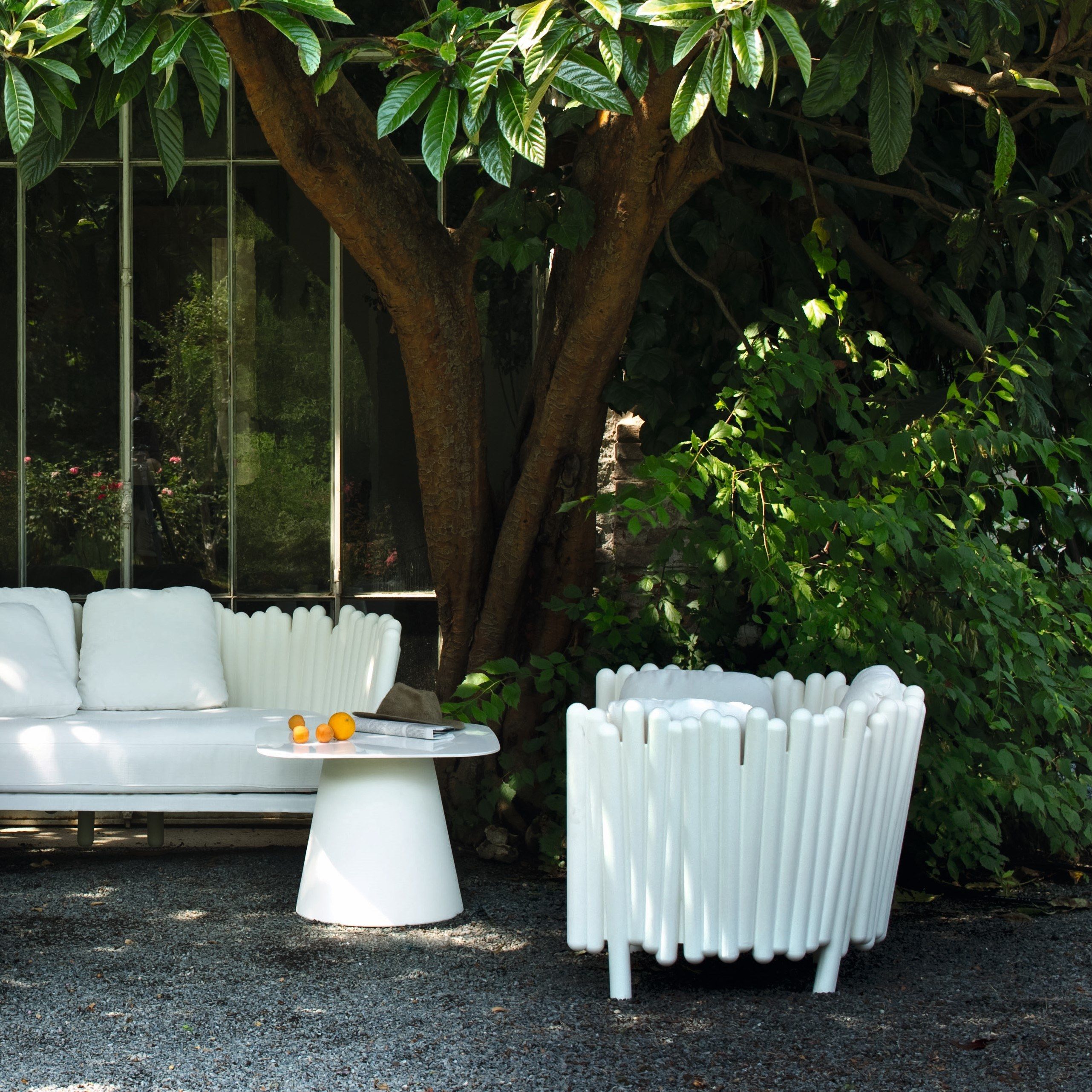 CANISSE Polyethylene garden armchair with armrests By Serralunga ...