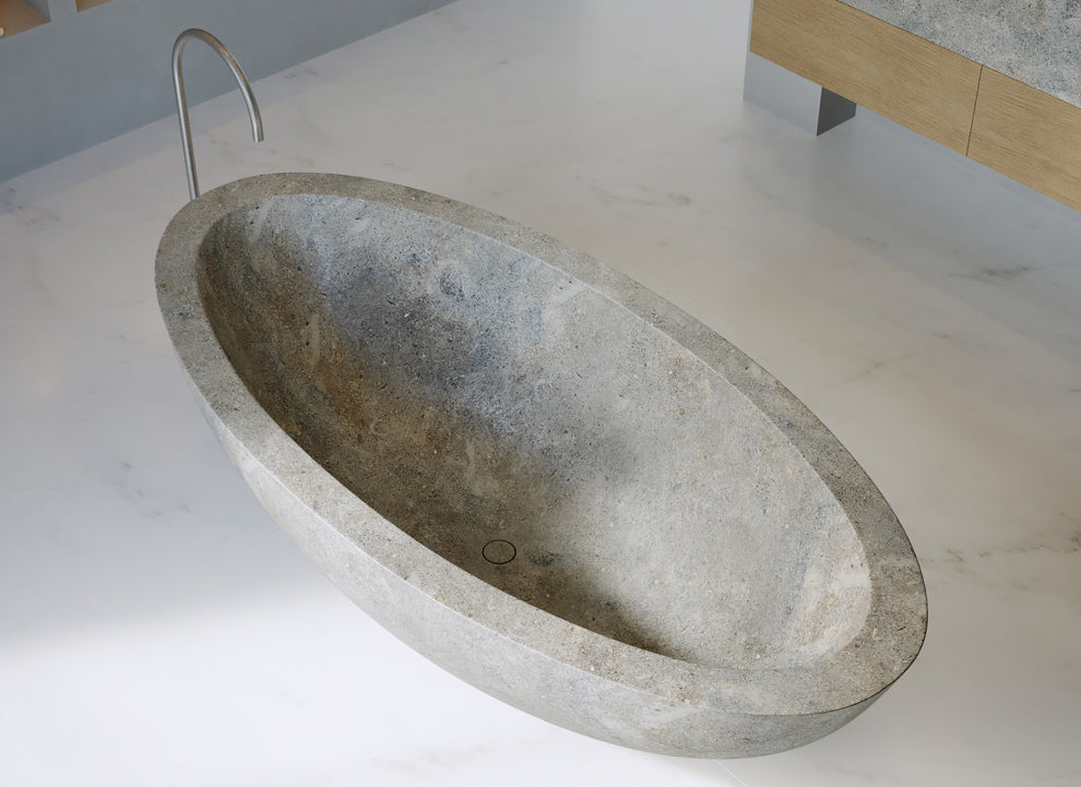 TULUM Freestanding oval natural stone bathtub By COCOON