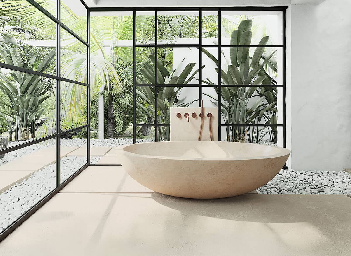TULUM Freestanding oval natural stone bathtub By COCOON