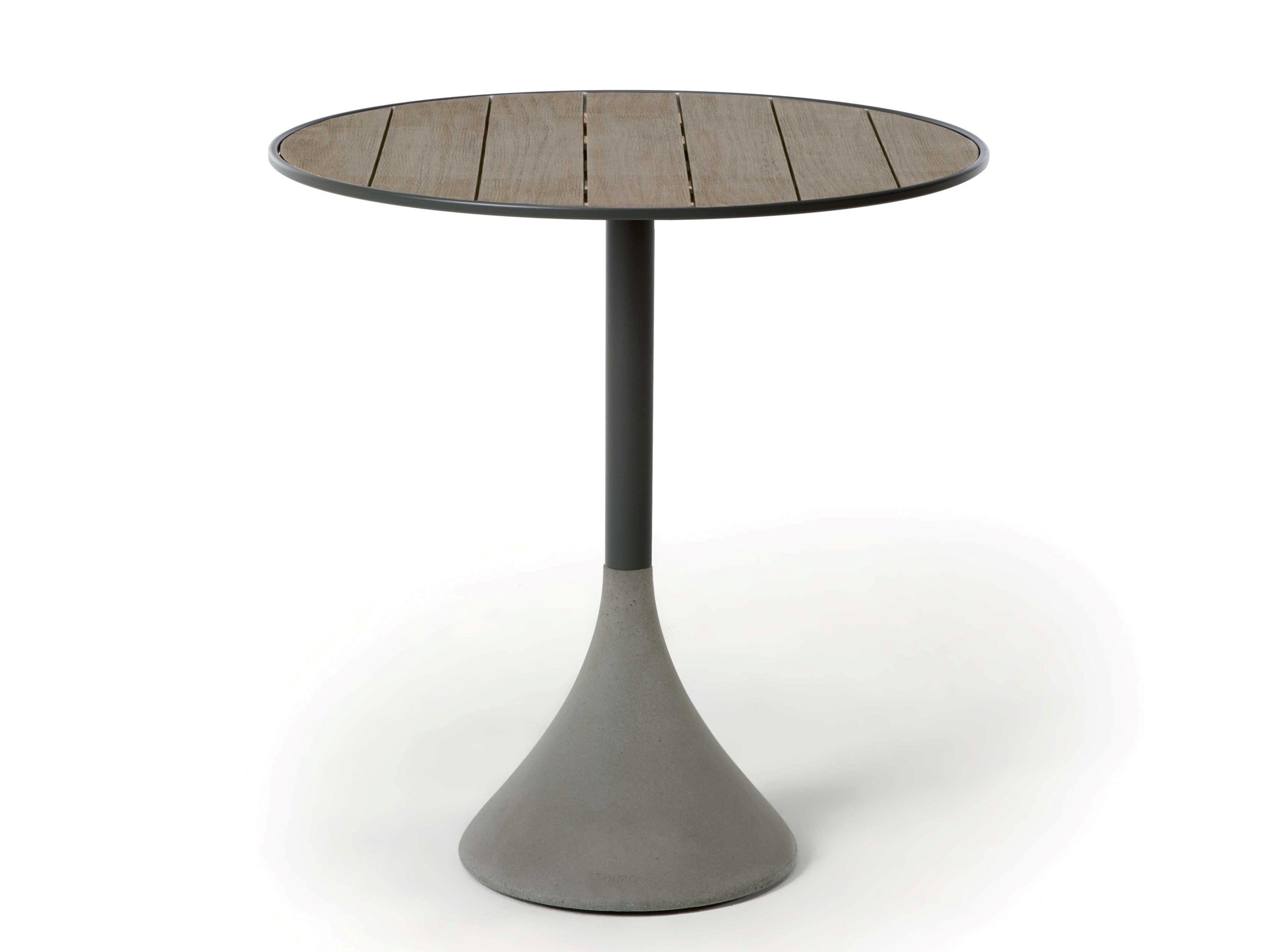 CONCRETO Round teak garden table By Ethimo | design Luca Nichetto