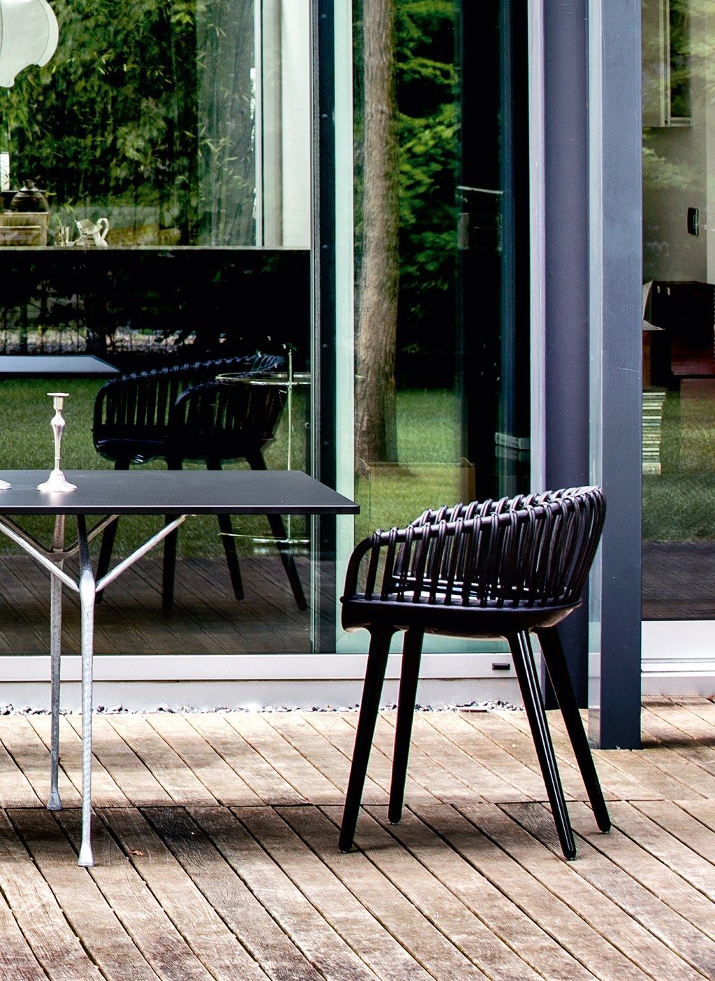 CYBORG CLUB Woven wicker chair with armrests By Magis