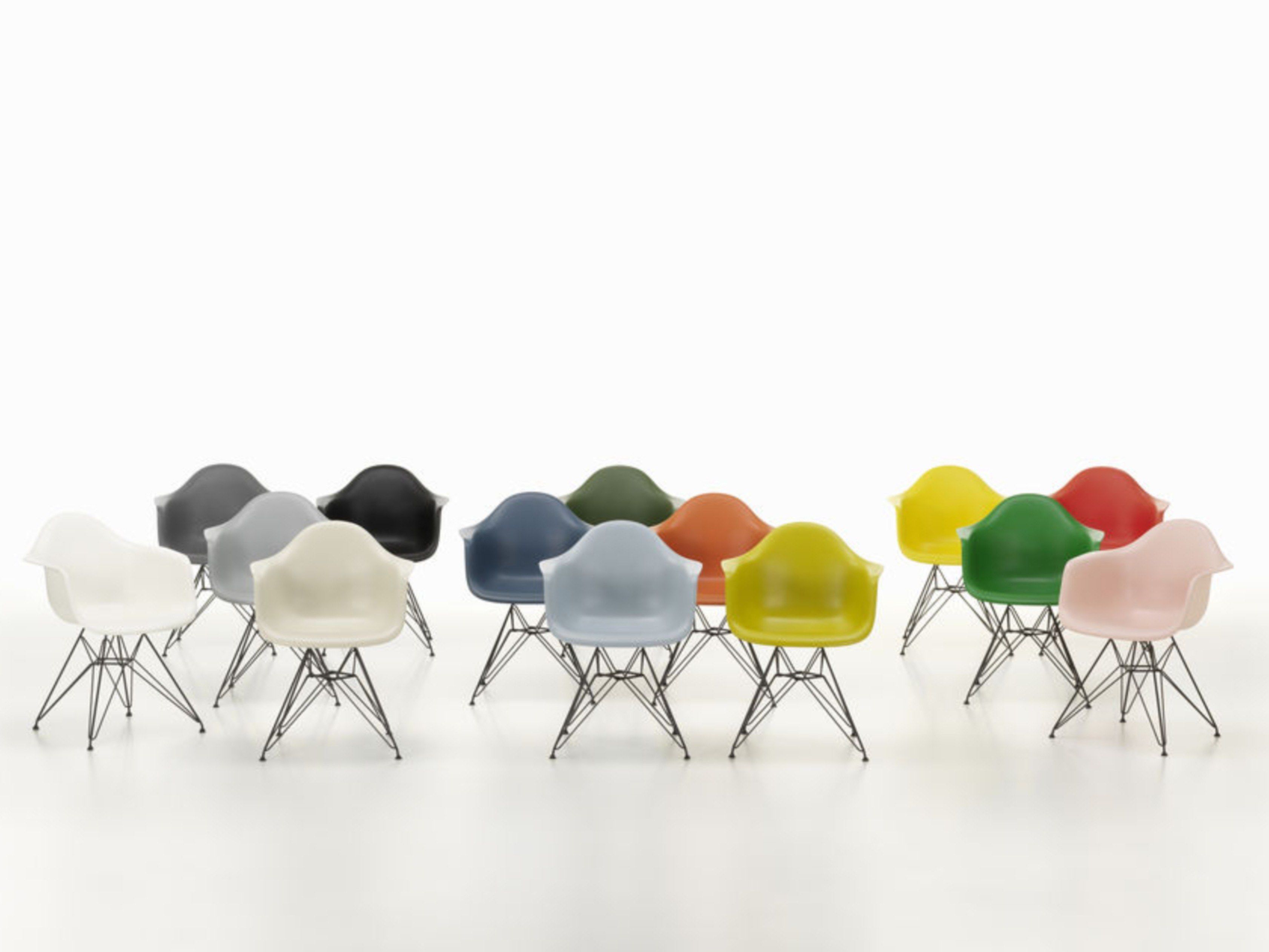 DAR Polypropylene chair with armrests By Vitra | design Charles & Ray Eames