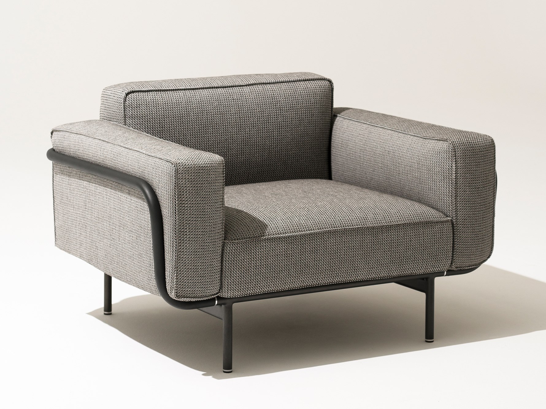 ESTENDO Fabric garden armchair with armrests By RODA | design Luca Pevere