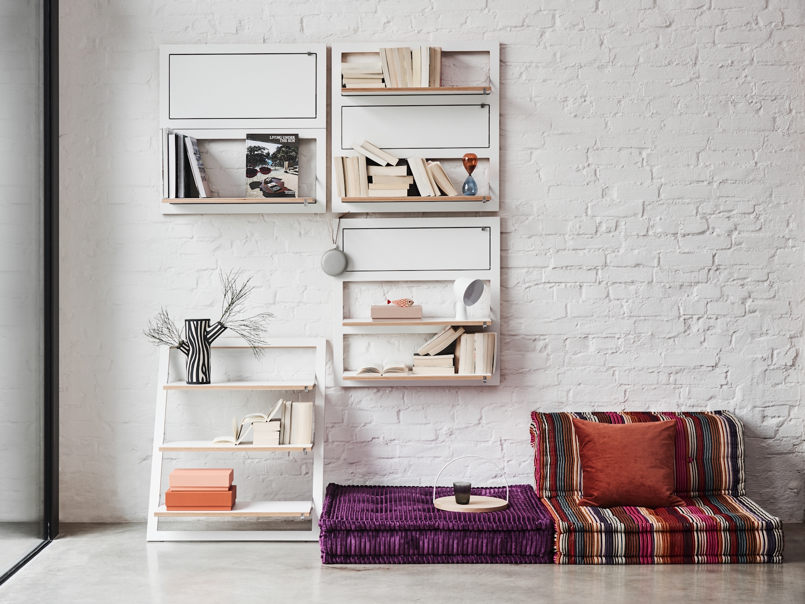 FLÄPPS SYSTEM Wall-mounted plywood storage wall By AMBIVALENZ
