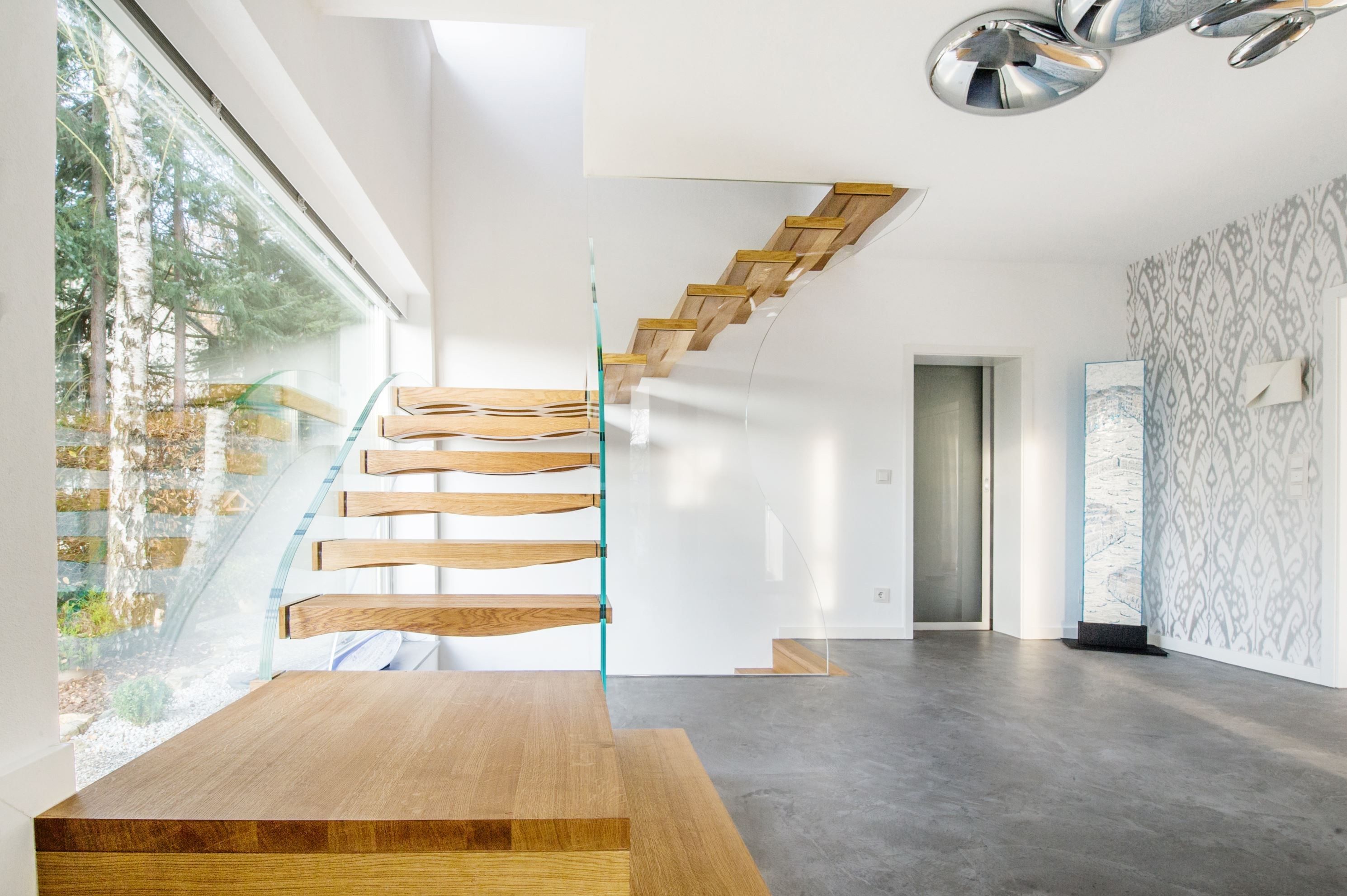 FLOATING WAVES | Cantilevered staircase By Siller Treppen