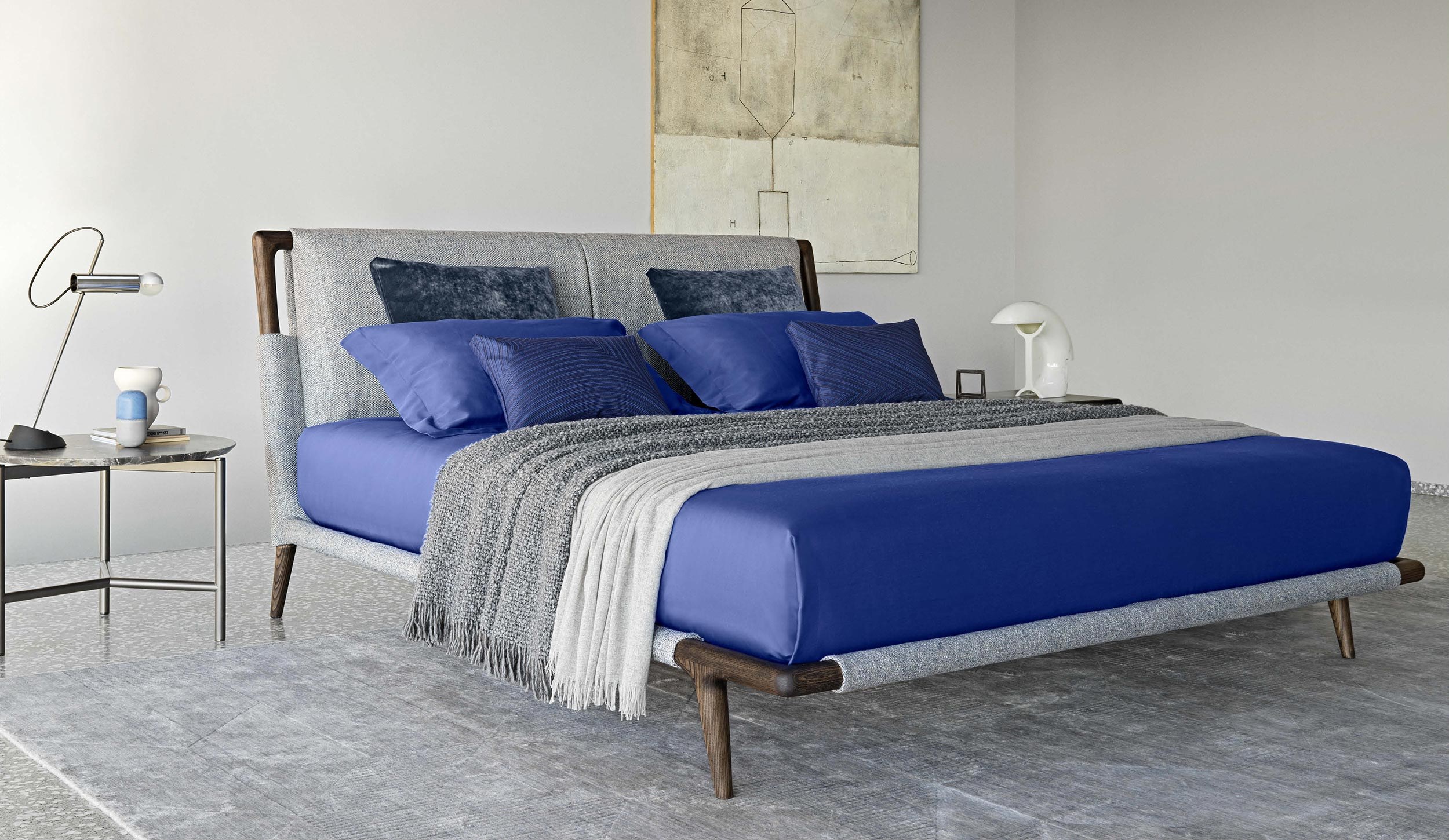 GAUDÍ Double bed with upholstered headboard By Flou