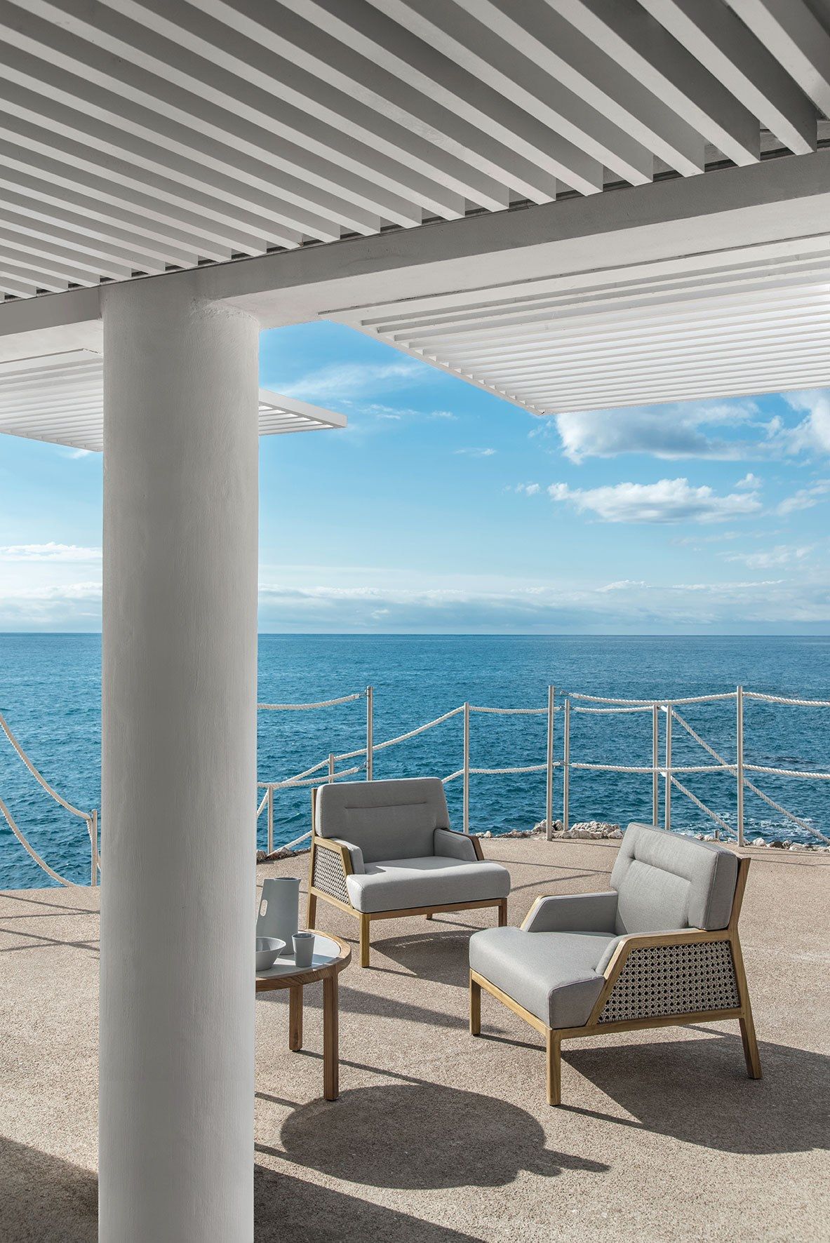 GRAND LIFE Bergère garden armchair with armrests By Ethimo | design ...