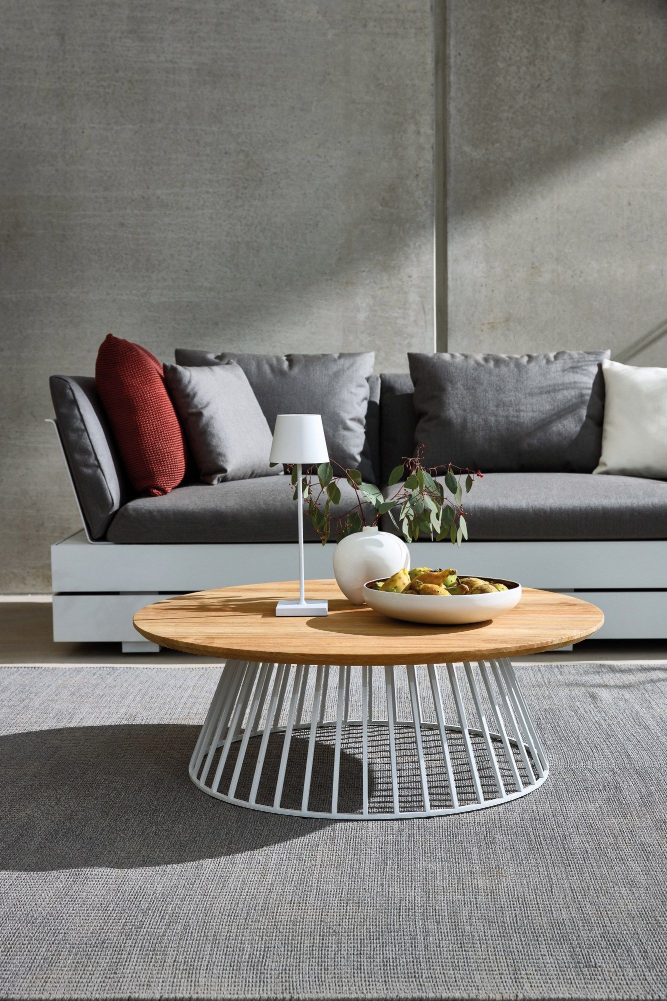 GRID Round teak garden side table By solpuri | design Karsten Weigel