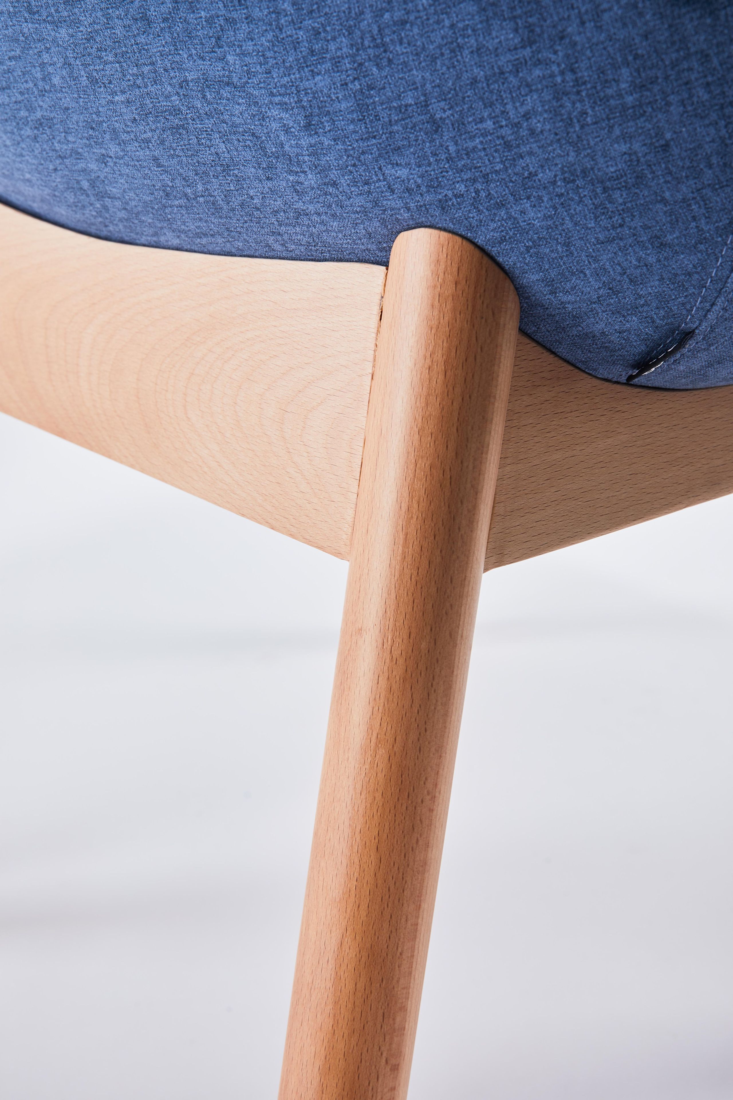 HUG Fabric easy chair with armrests By grado design | design Peter Fei