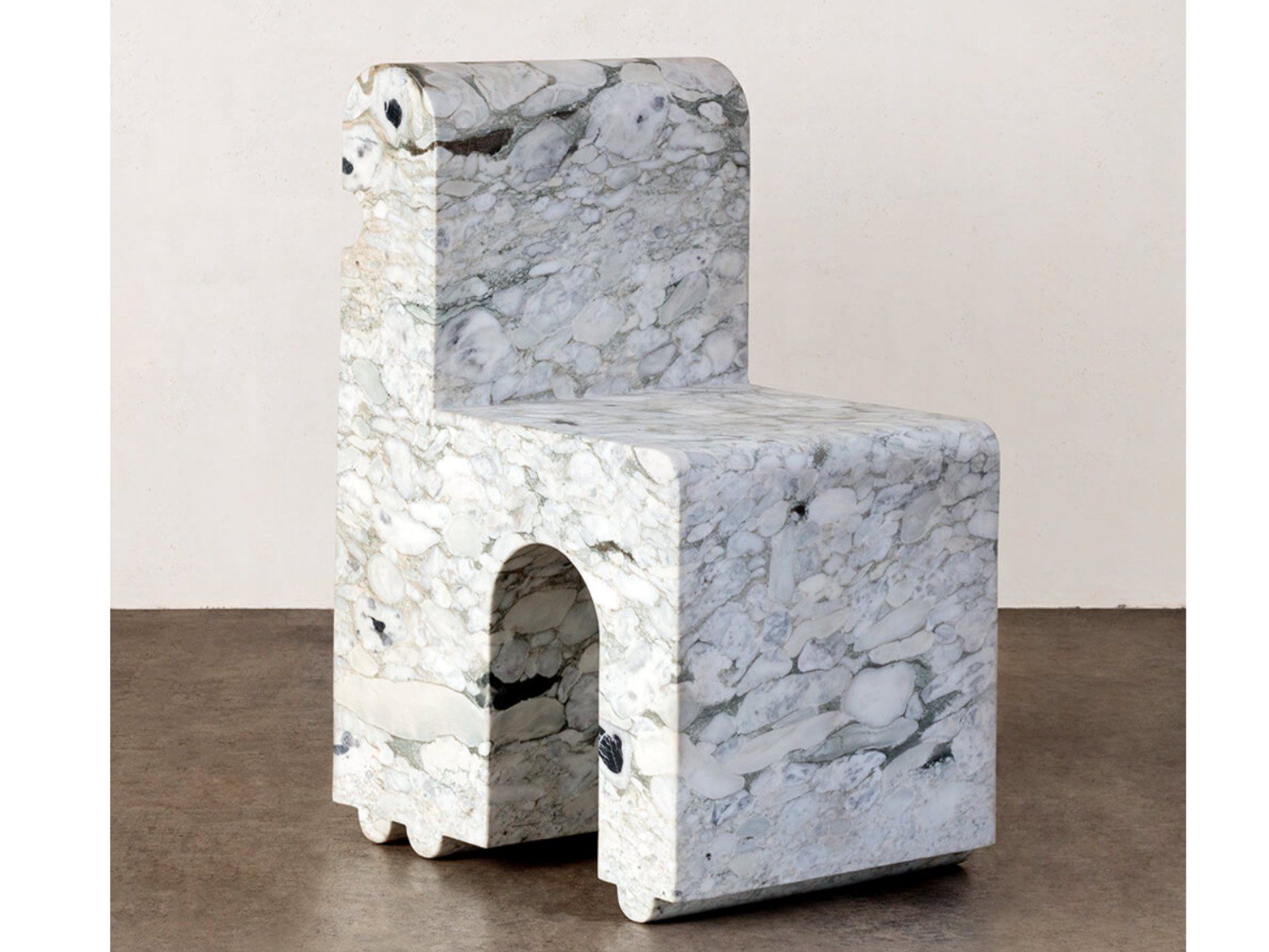 HUME Natural stone chair By Kelly Wearstler