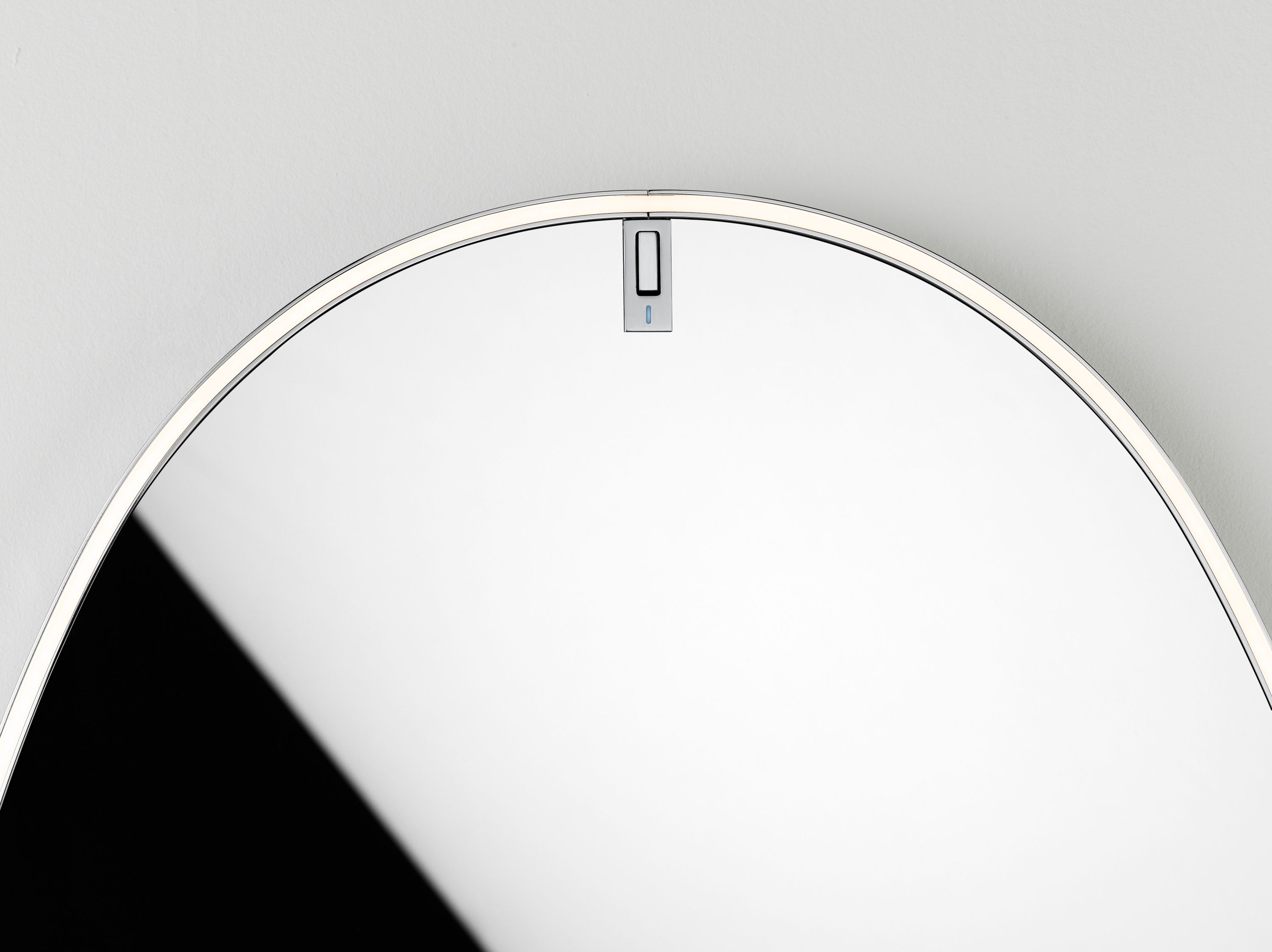 Oval wall-mounted mirror with integrated lighting LA PLUS BELLE By Flos ...