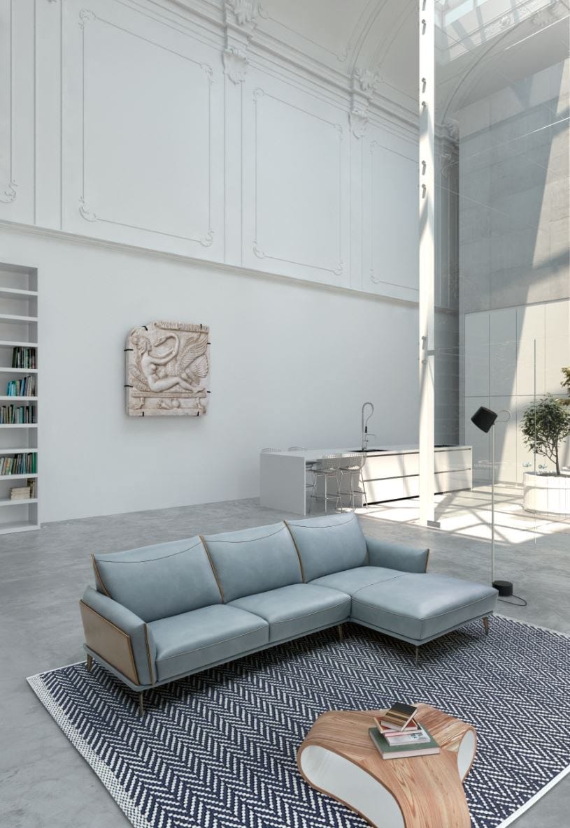 LIBECCIO Leather sofa with chaise longue By Cubo Rosso