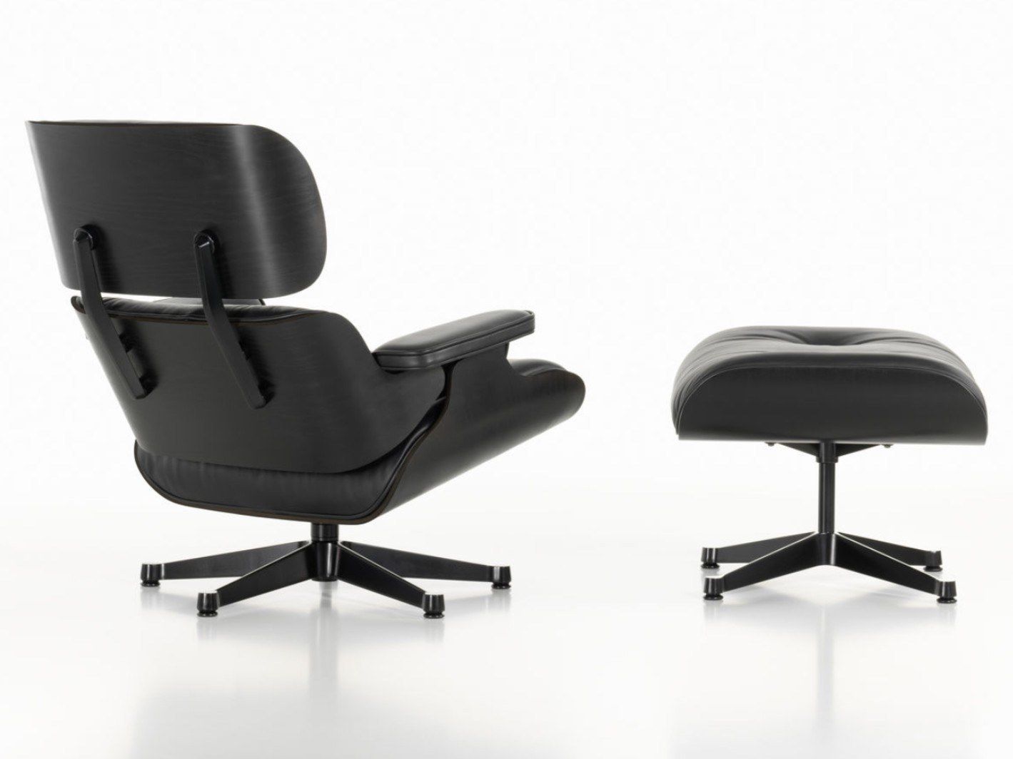 EAMES LOUNGE CHAIR & OTTOMAN - BLACK VERSION Swivel leather armchair ...