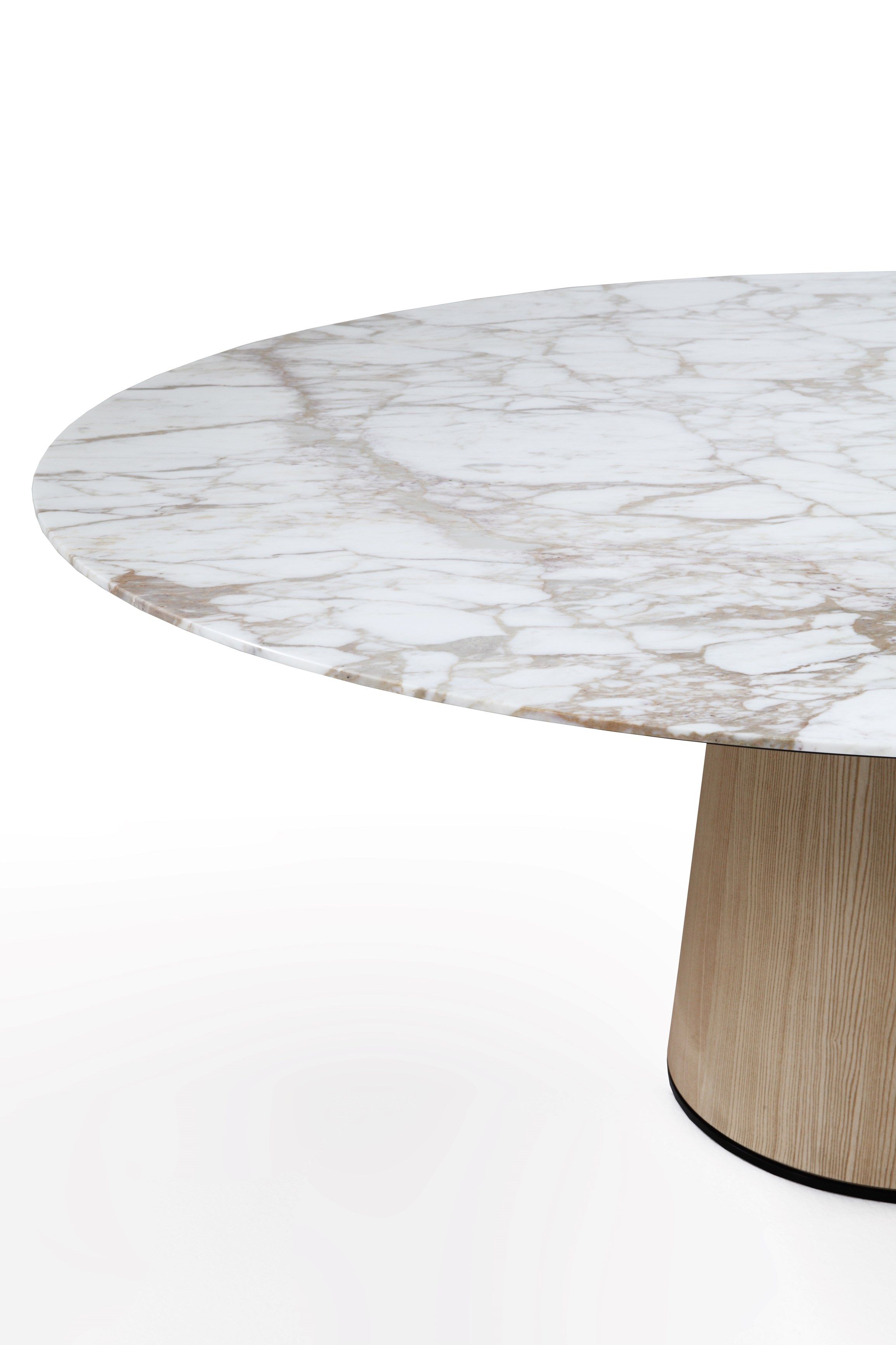 MATERIC Round dining table By Porro