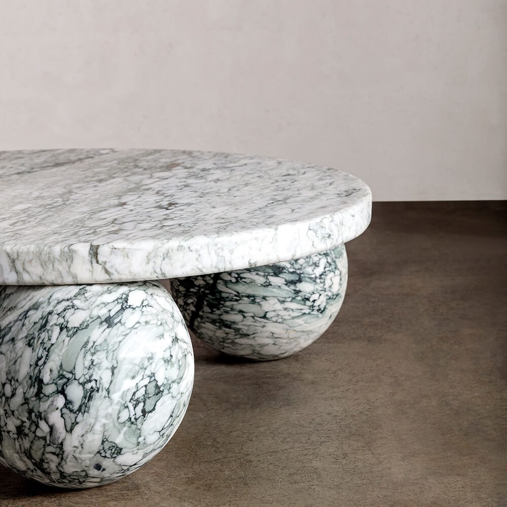 MORRO Round natural stone coffee table By Kelly Wearstler