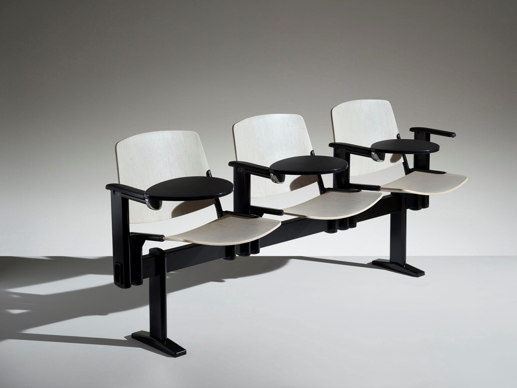 NEW MODULAMM Wooden beam seating with armrests with writing tablet By ...