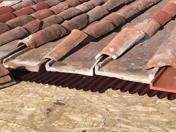 Sistema di impermeabilizzazione e isolamento integrati per tetti e ...