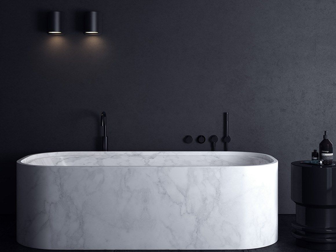 Freestanding oval natural stone bathtub PB BATH By COCOON design Piet Boon