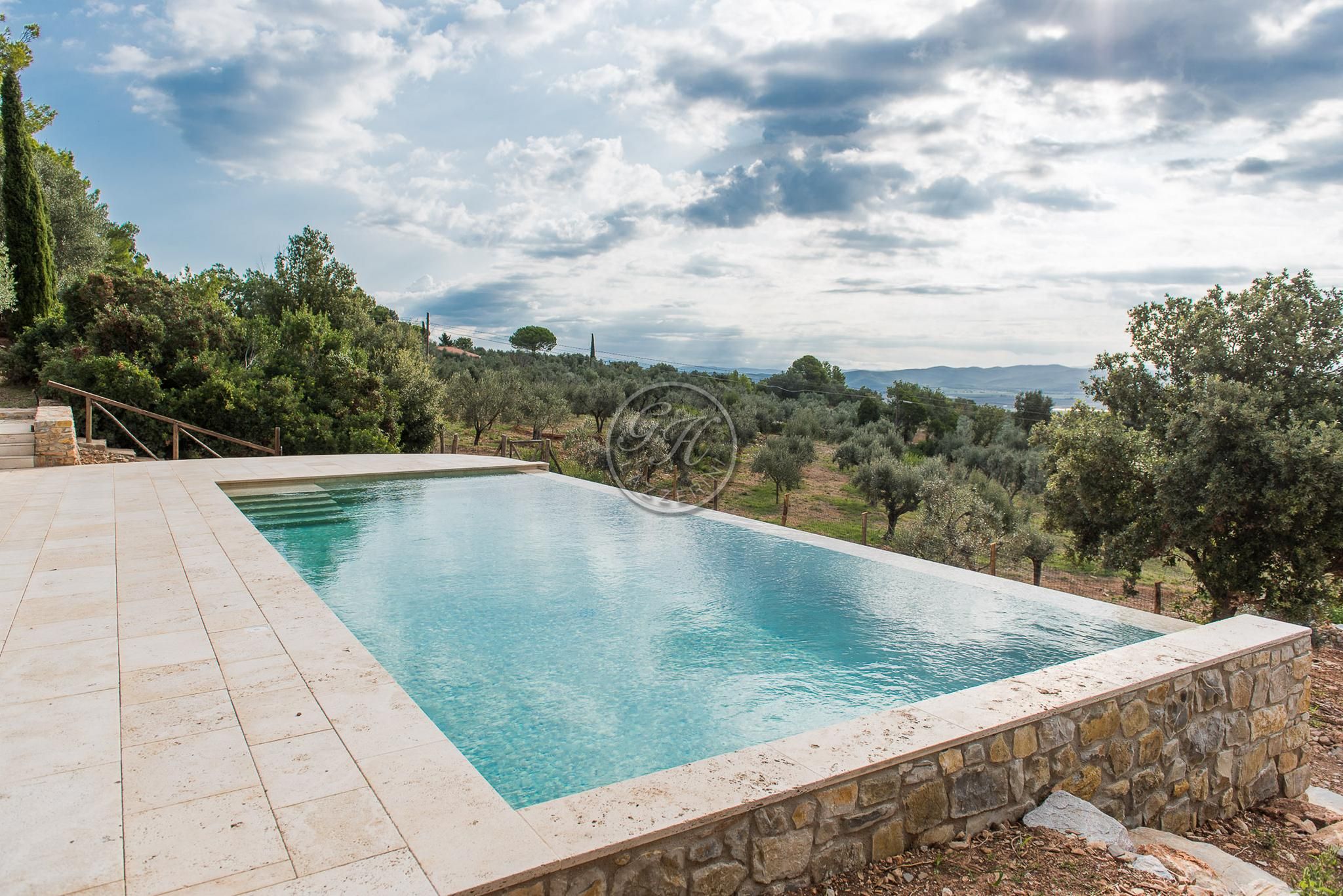 Infinity natural stone swimming pool with waterfall Swimming pool 17 By ...