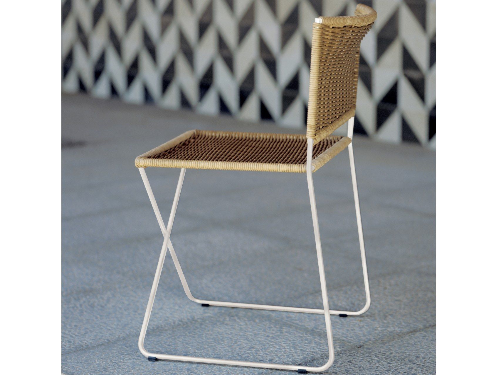 Stackable rattan chair RAMÓN By Santa & Cole