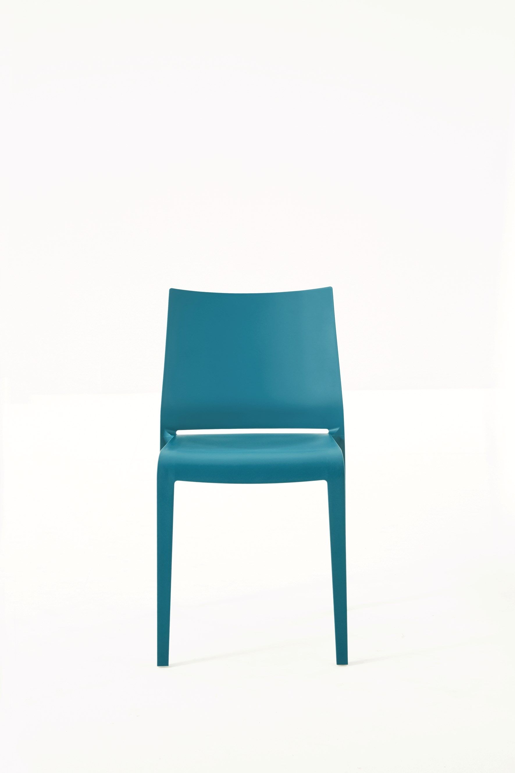 Stackable polyethylene chair RIGA By Desalto design Claudio Dondoli ...