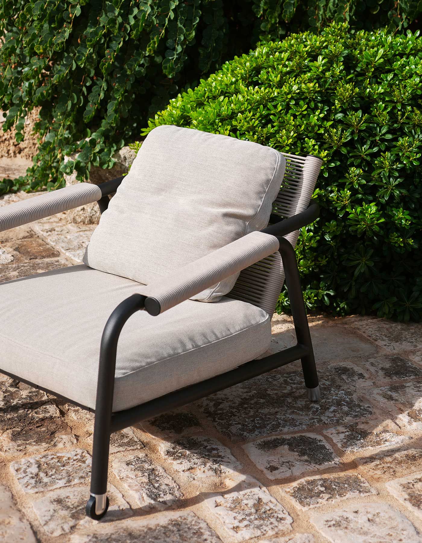 ASTRA Fabric garden armchair with armrests By RODA | design Rodolfo Dordoni