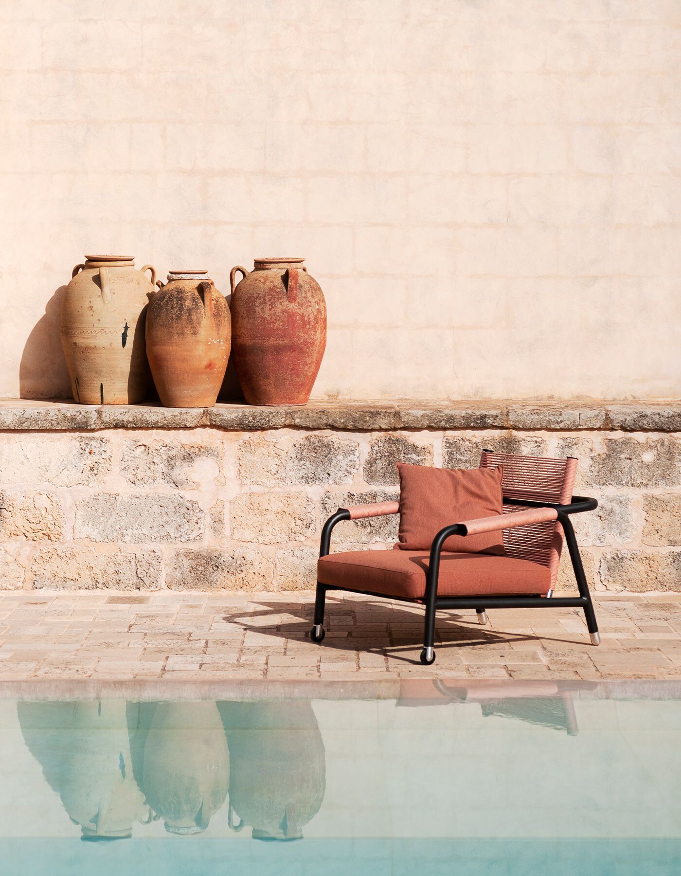 ASTRA Fabric garden armchair with armrests By RODA | design Rodolfo Dordoni