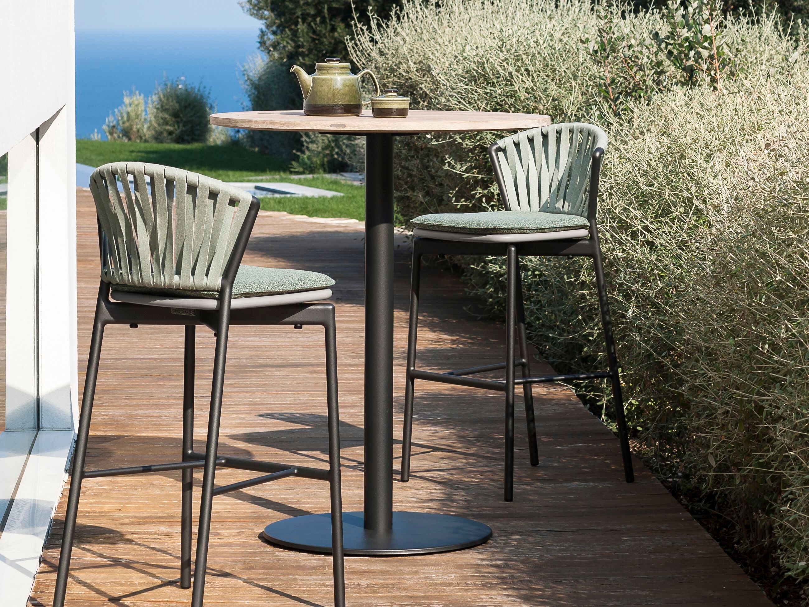 BUTTON Round teak garden table By RODA