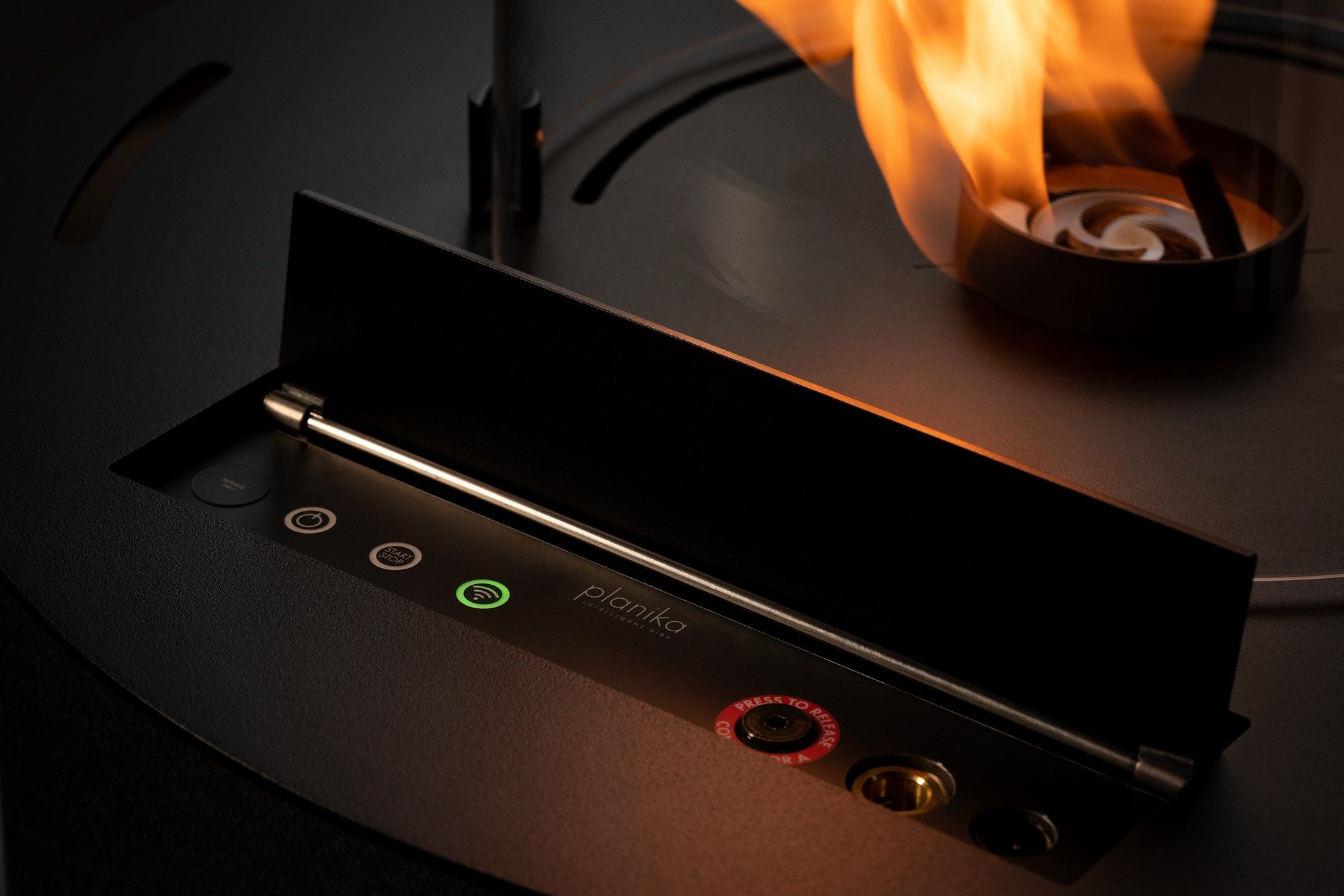 RONDO AUTOMATIC Bioethanol steel fireplace By Planika