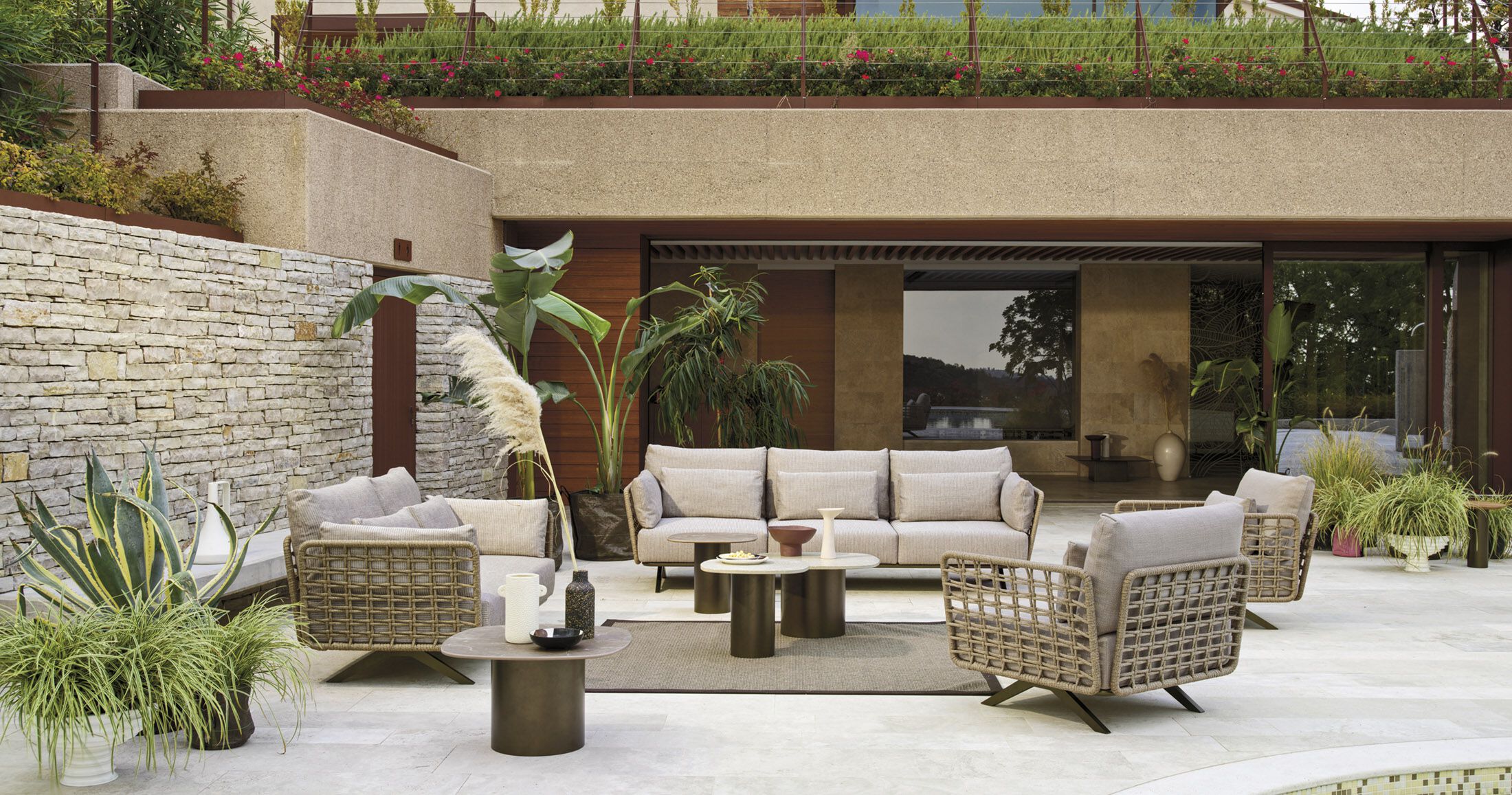 ARMÀN Armchair woven with polyester rope and armrests By Roberti