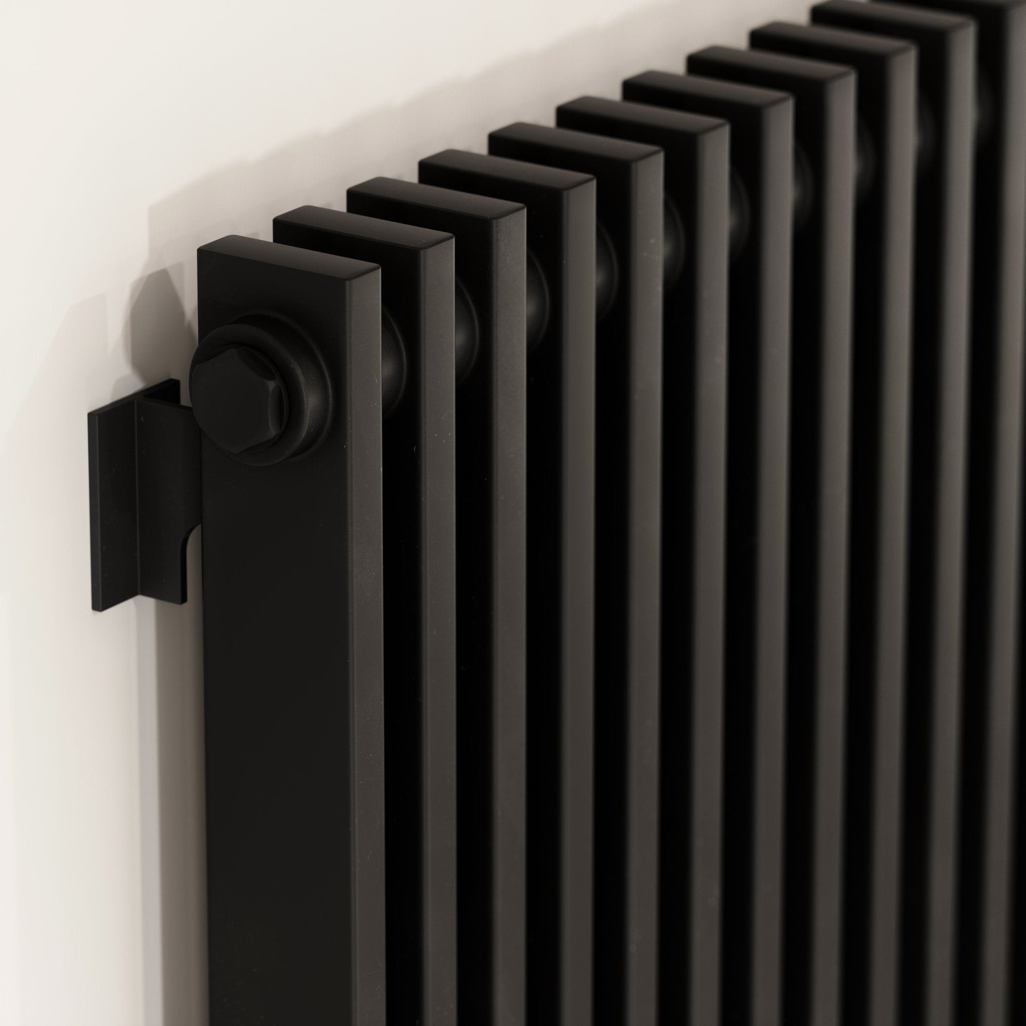 SHADOW Vertical wall-mounted decorative radiator By LUSSO