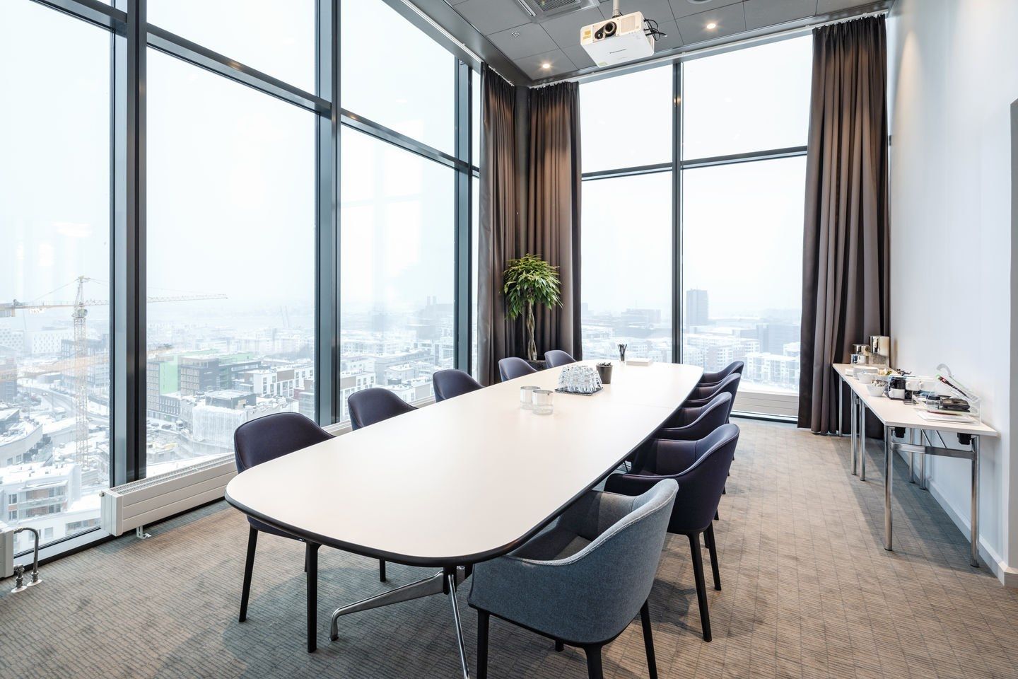 SOFTSHELL CHAIR FOUR LEGGED BASE Upholstered fabric chair with armrests ...