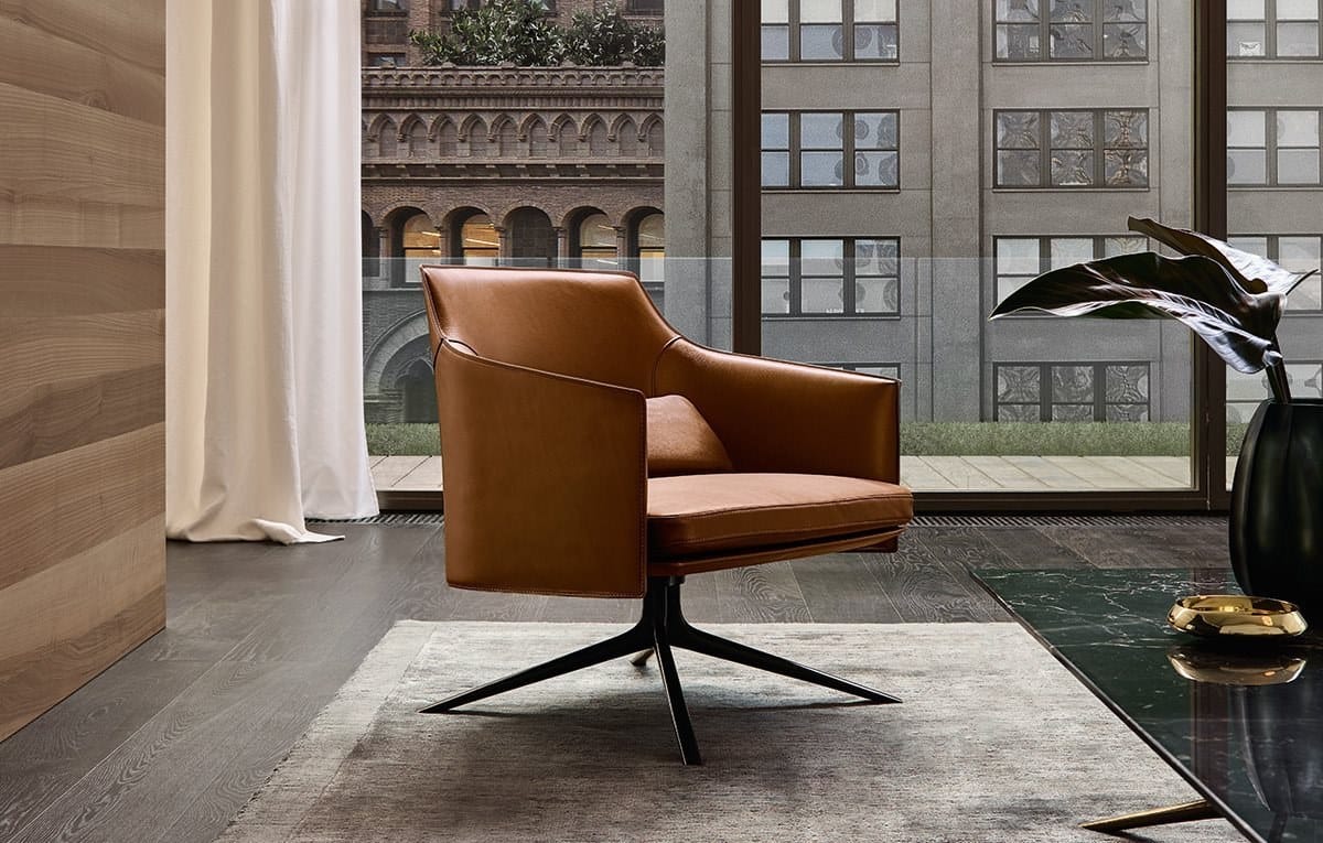 STANFORD Swivel tanned leather armchair with armrests By Poliform ...
