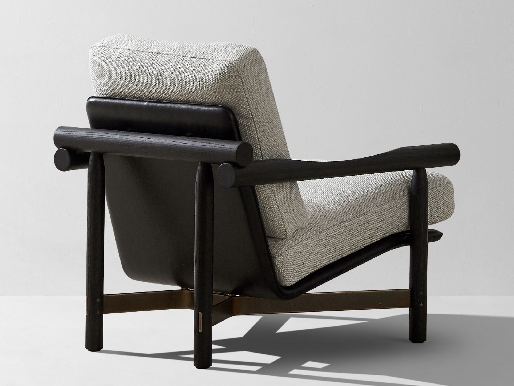 STILT Wooden armchair with armrests By District Eight