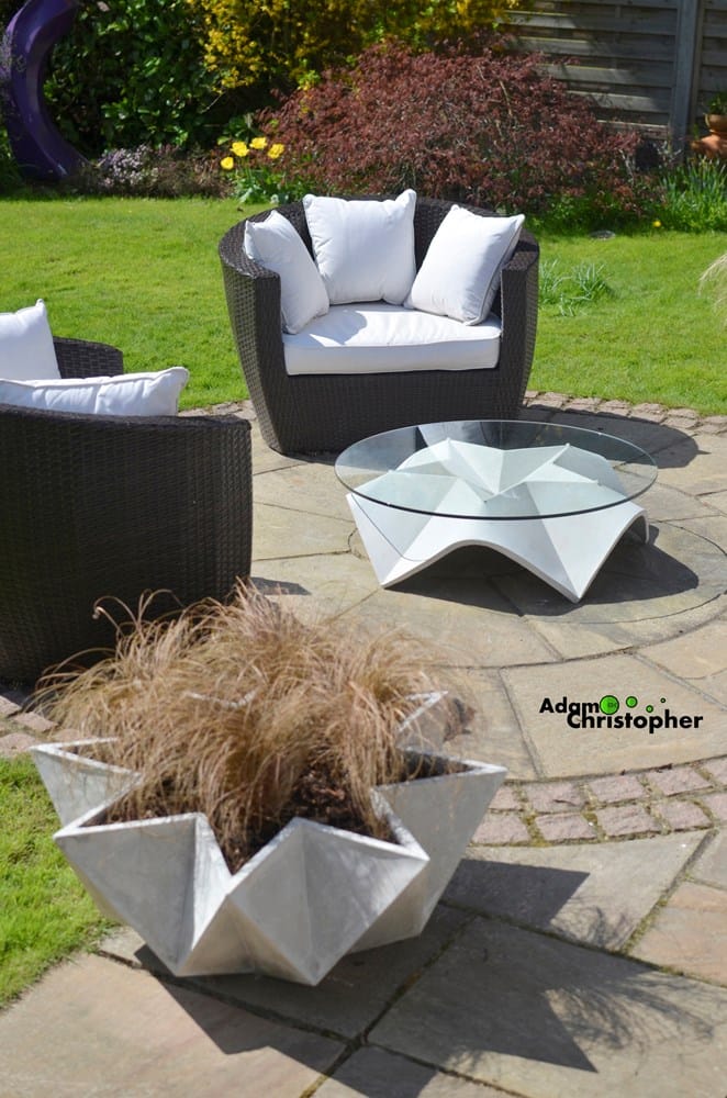 Round concrete garden side table STJERNE By Adam Christopher design ...