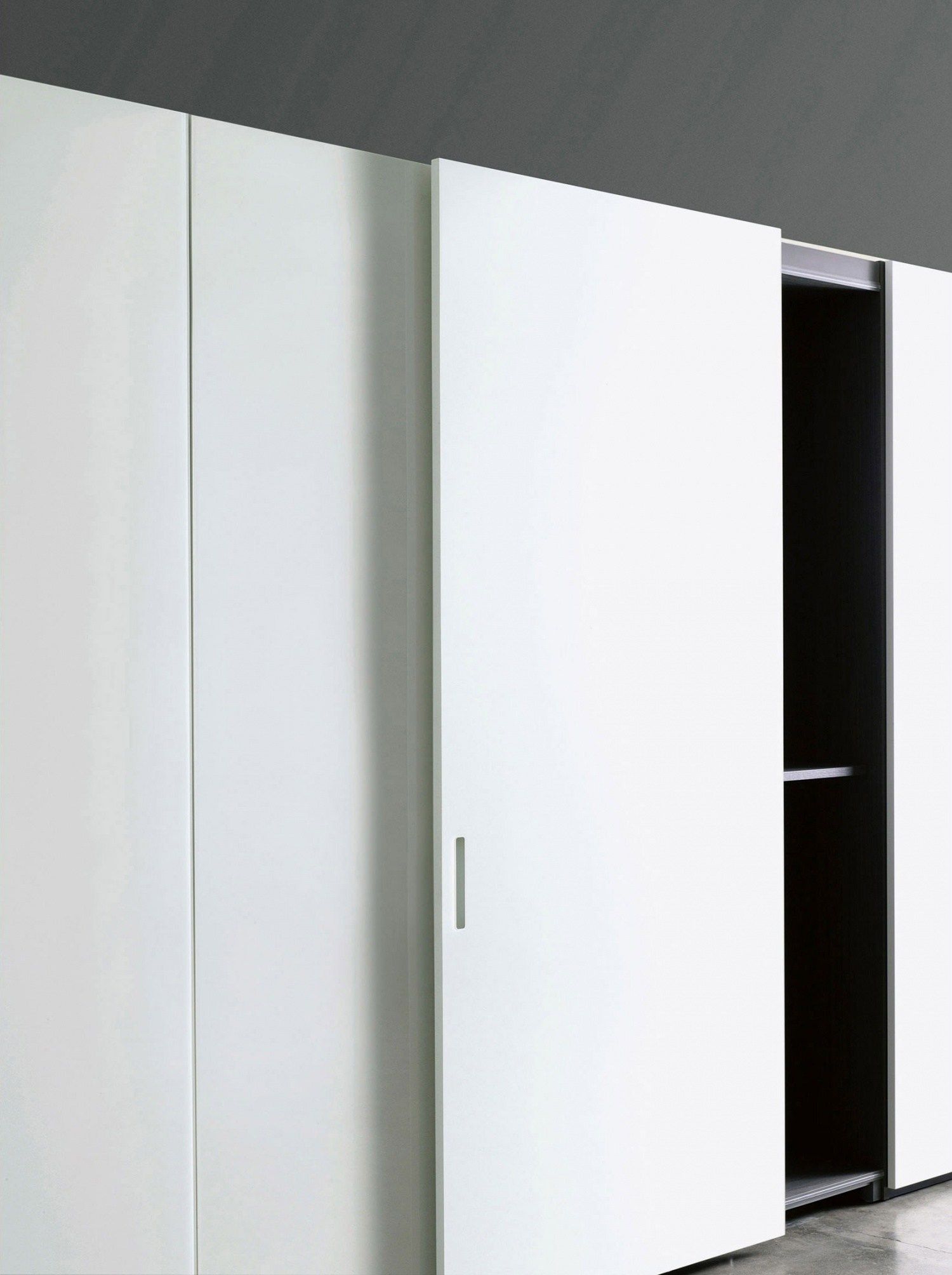 STORAGE PULL-OUT SLIDING Sectional wardrobe with coplanar doors custom ...