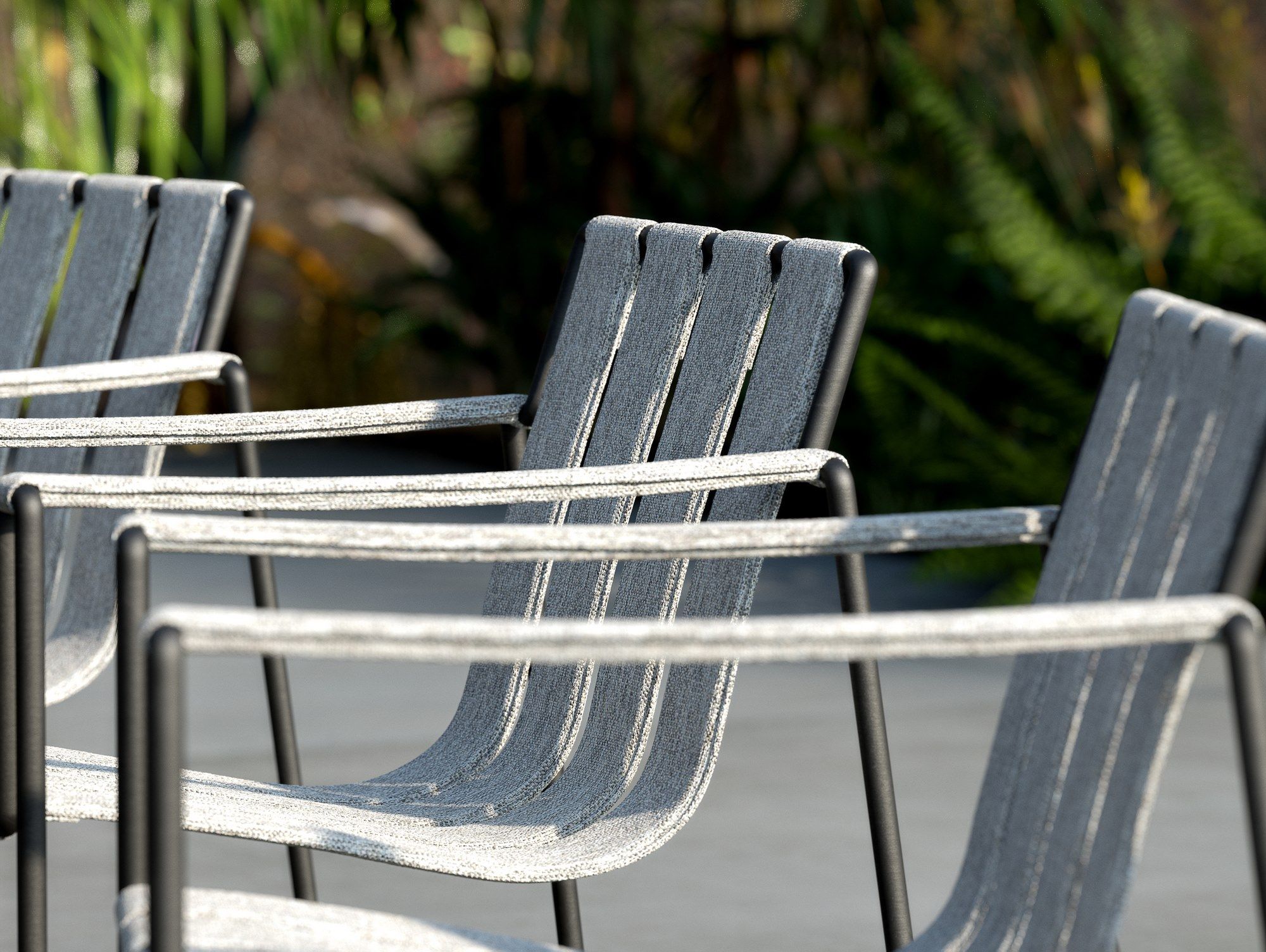 STRAPPY Sled base fabric garden chair with armrests By Royal Botania