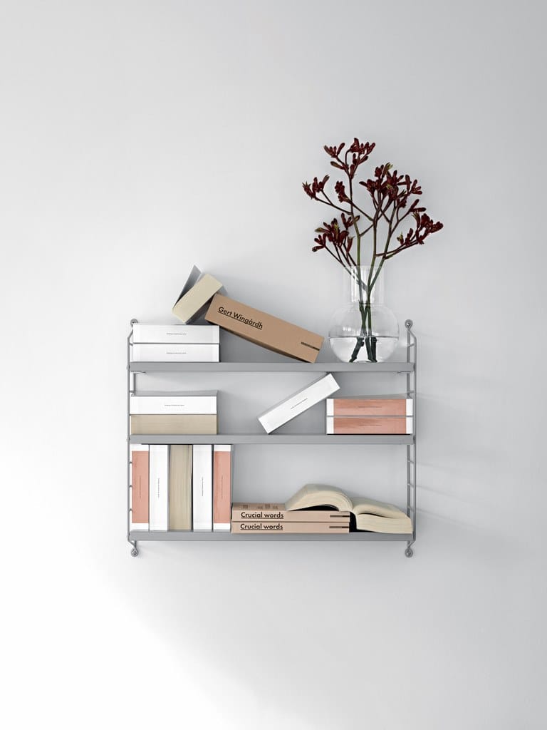STRING® POCKET Wall-mounted modular MDF shelving unit By String Furniture