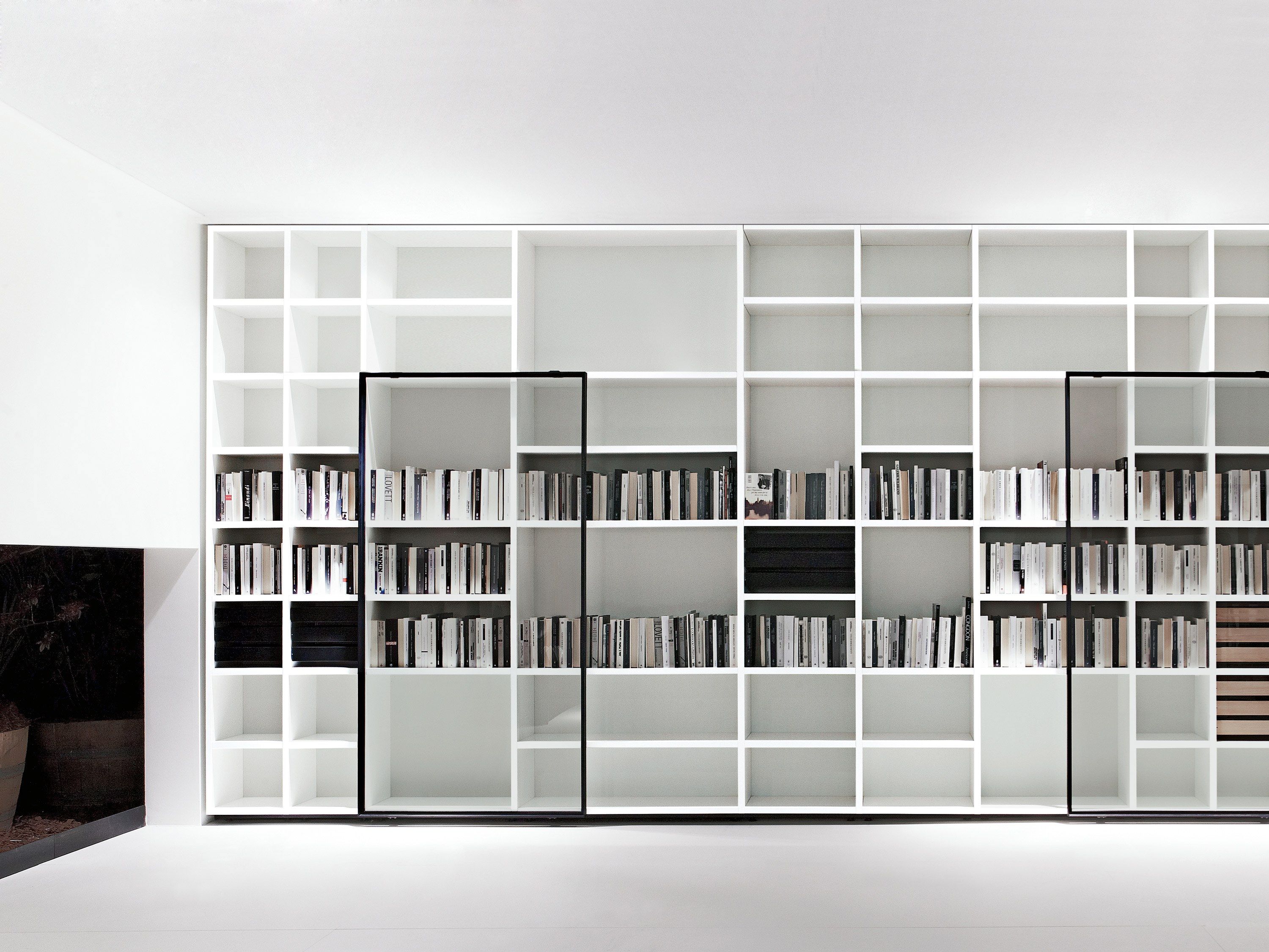 SYSTEM 2018 Wall-mounted walnut bookcase By Porro | design Piero Lissoni