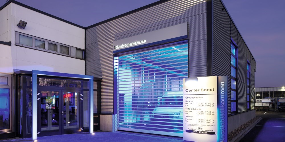 Slatted exterior doors Sectional door By ASSA ABLOY Entrance Systems