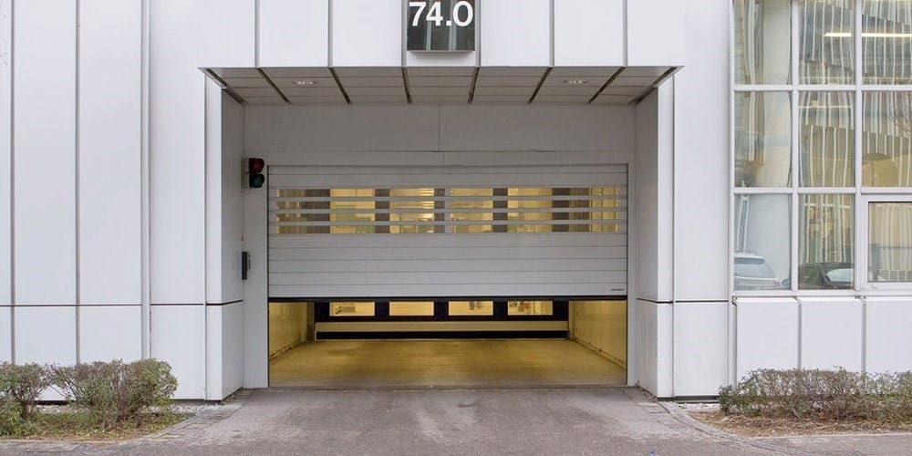 Slatted exterior doors Sectional door By ASSA ABLOY Entrance Systems