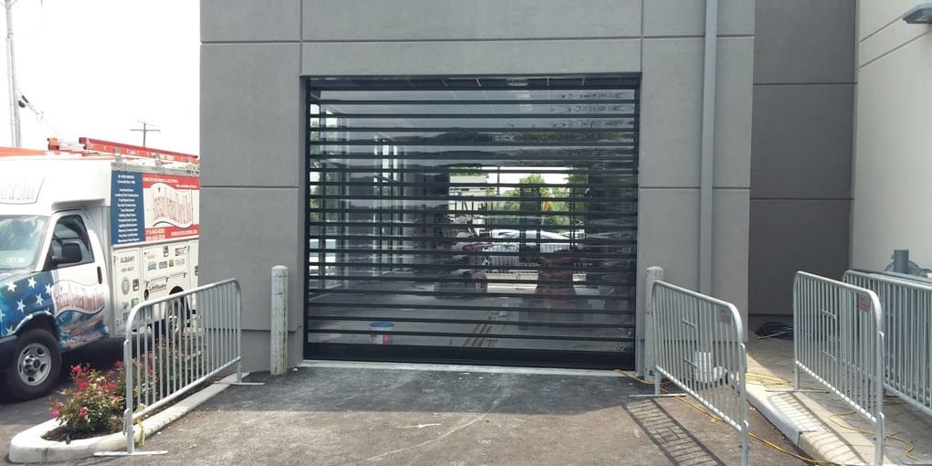 Sectional door Slatted exterior doors By ASSA ABLOY Entrance Systems