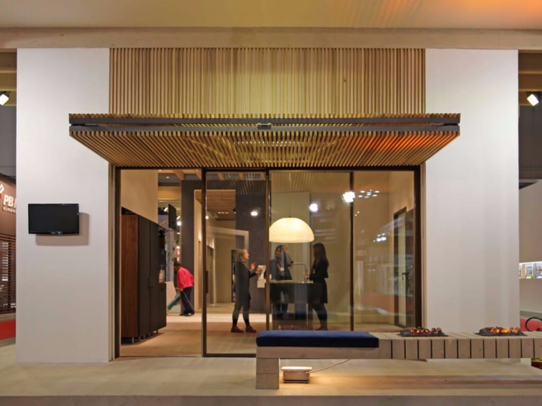 Solar shading with knee type opening Wooden solar shading By Carminati