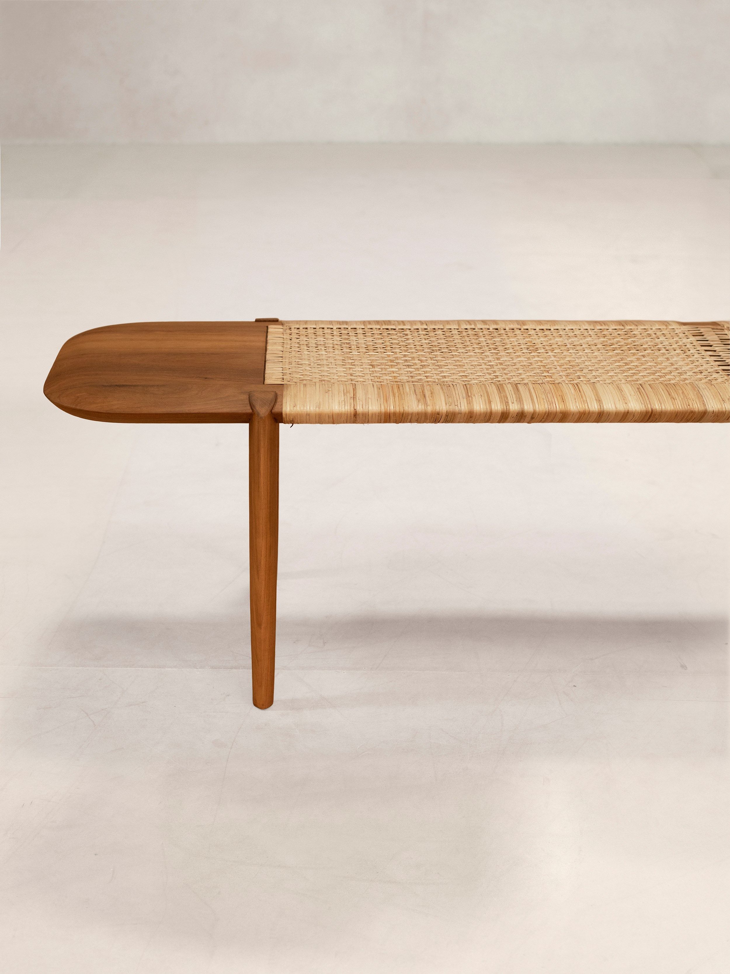 Tangāli Bench in teak and cane By Phantom Hands | design Inoda + Sveje