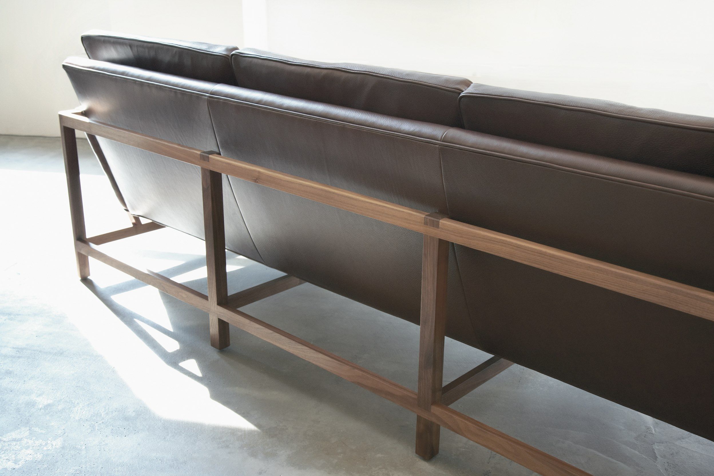 WOOD FRAME LOUNGE | Low Back Sofa By BassamFellows design Craig Bassam